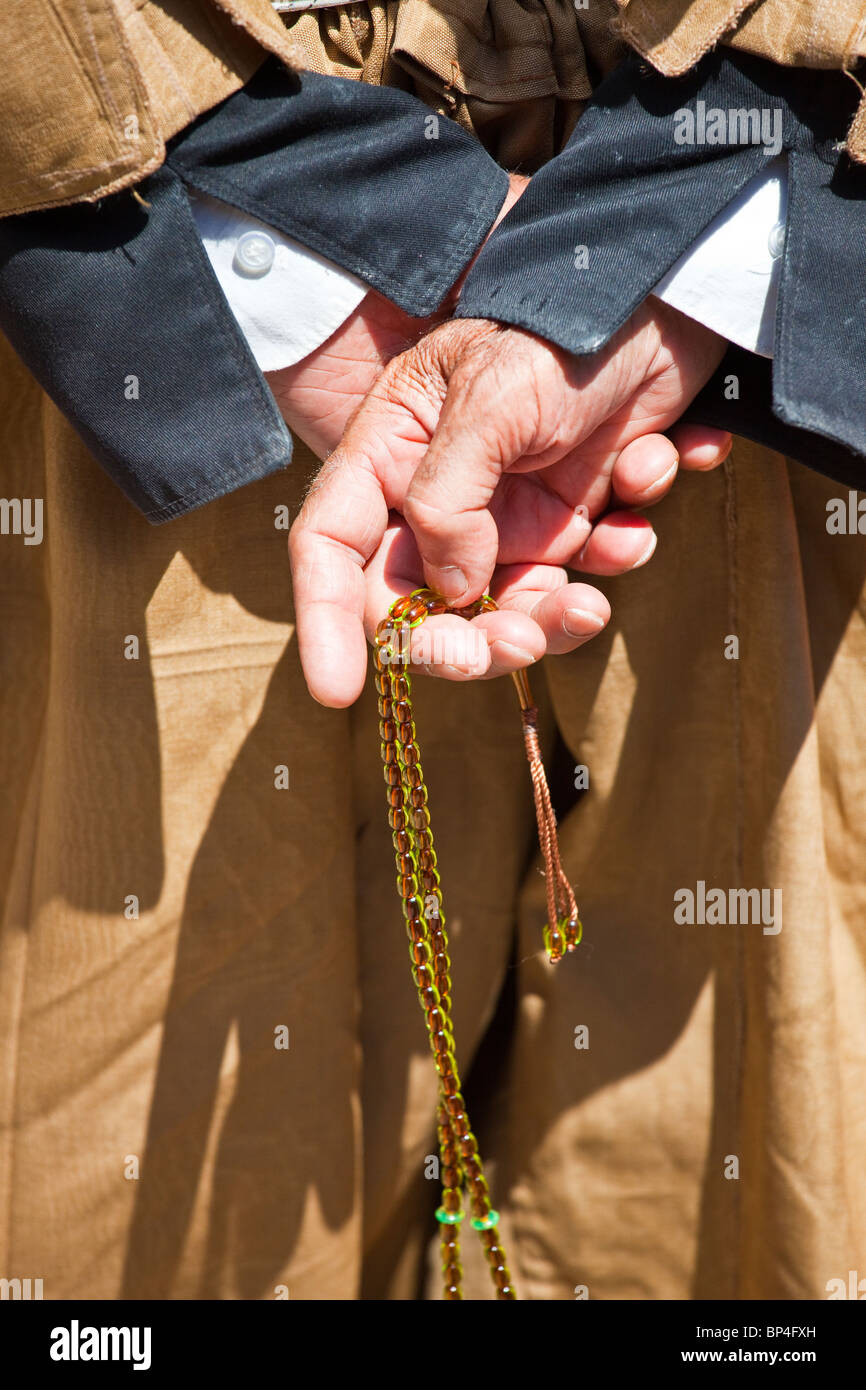 Kurdish Iraqi man counting Muslim prayer beads in Dohuk, Kurdistan ...