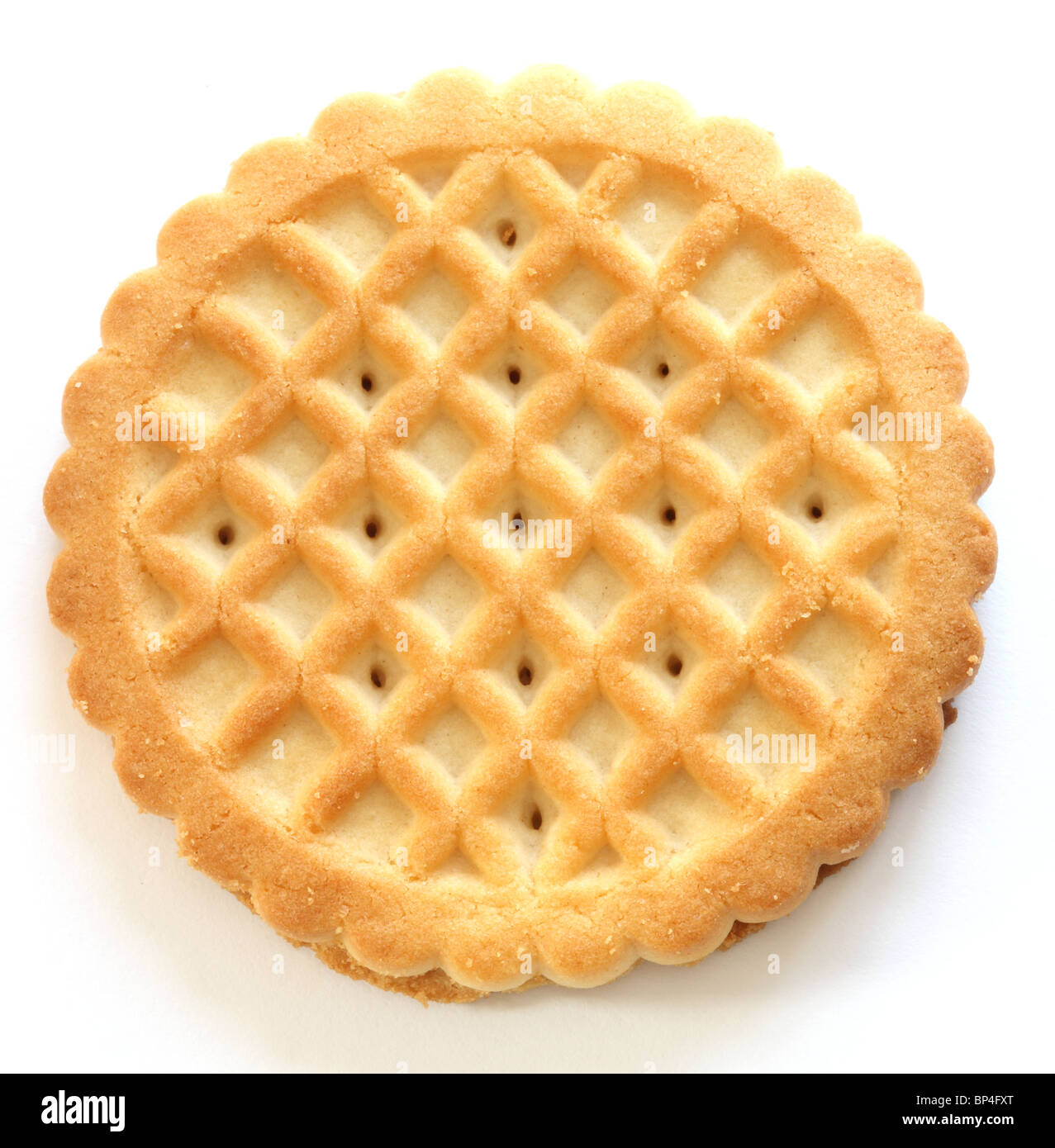 One golden shortbread butter biscuits on white background Stock Photo ...