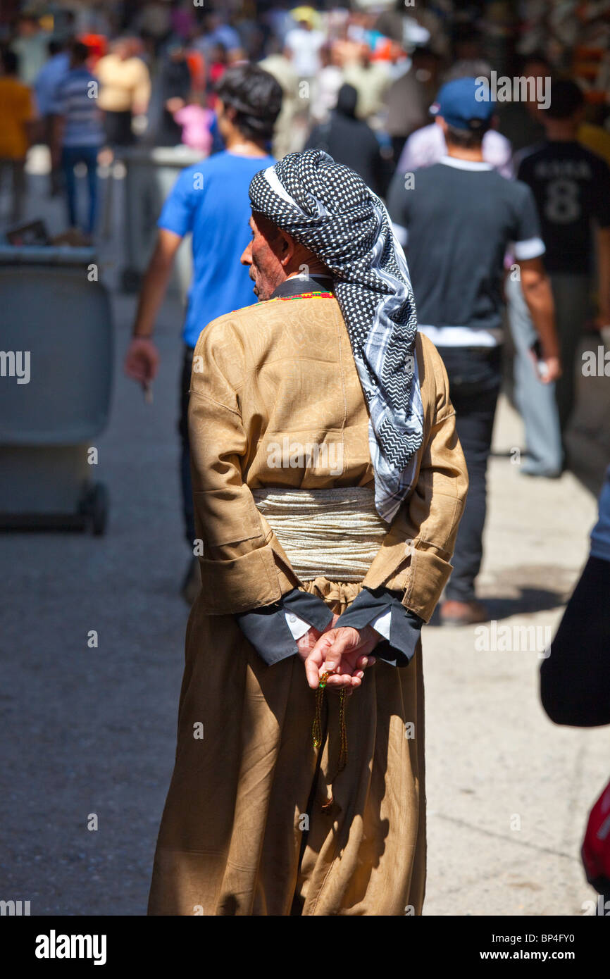 Kurdish Iraqi man counting Muslim prayer beads in Dohuk, Kurdistan ...