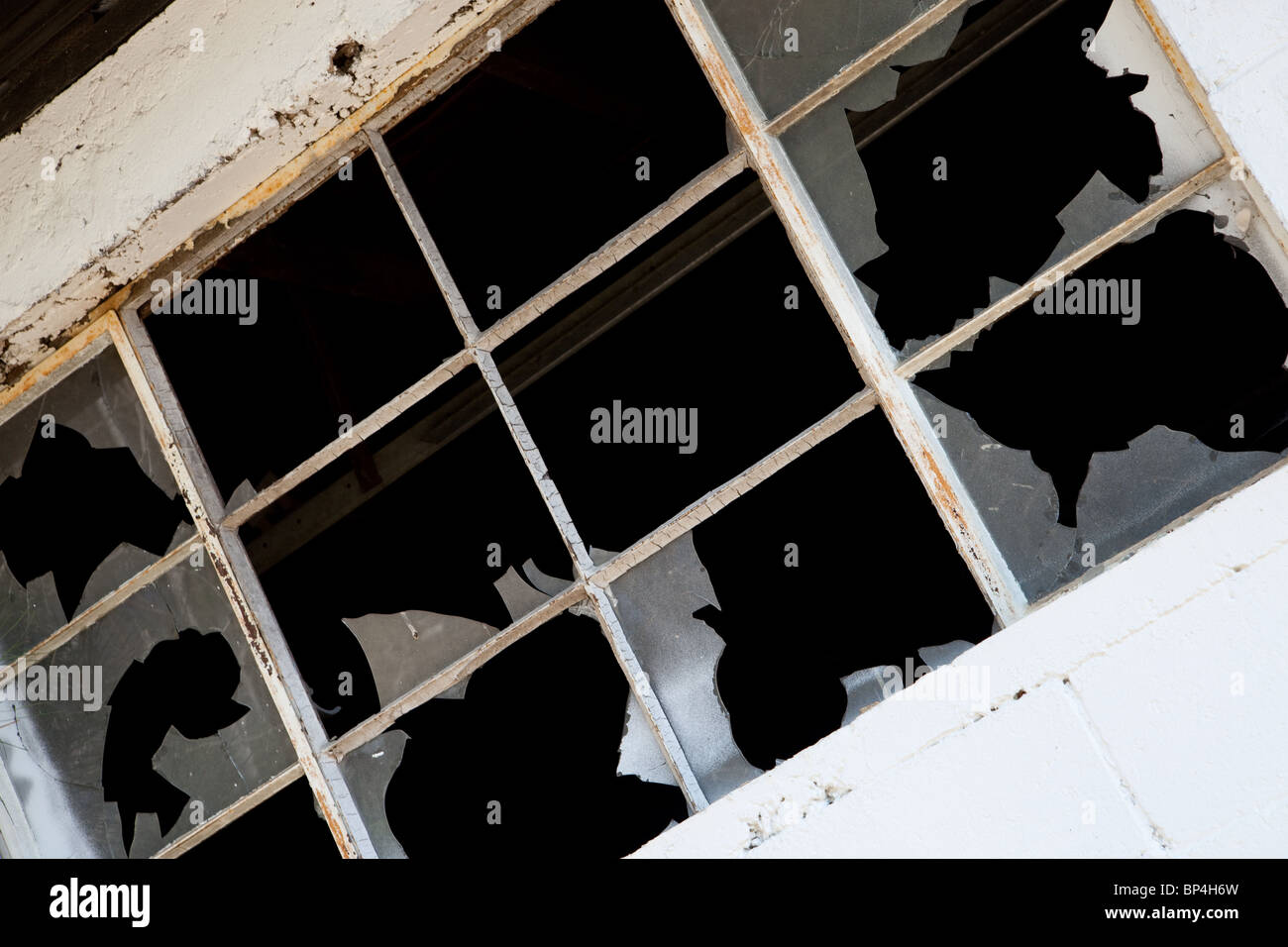 Broken windows in an old building Stock Photo - Alamy