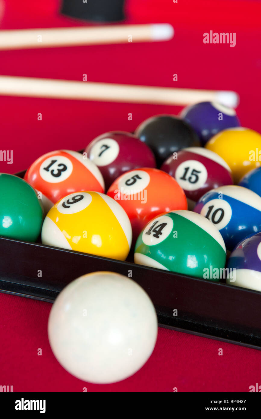 Pool billiards on red table to play Stock Photo - Alamy