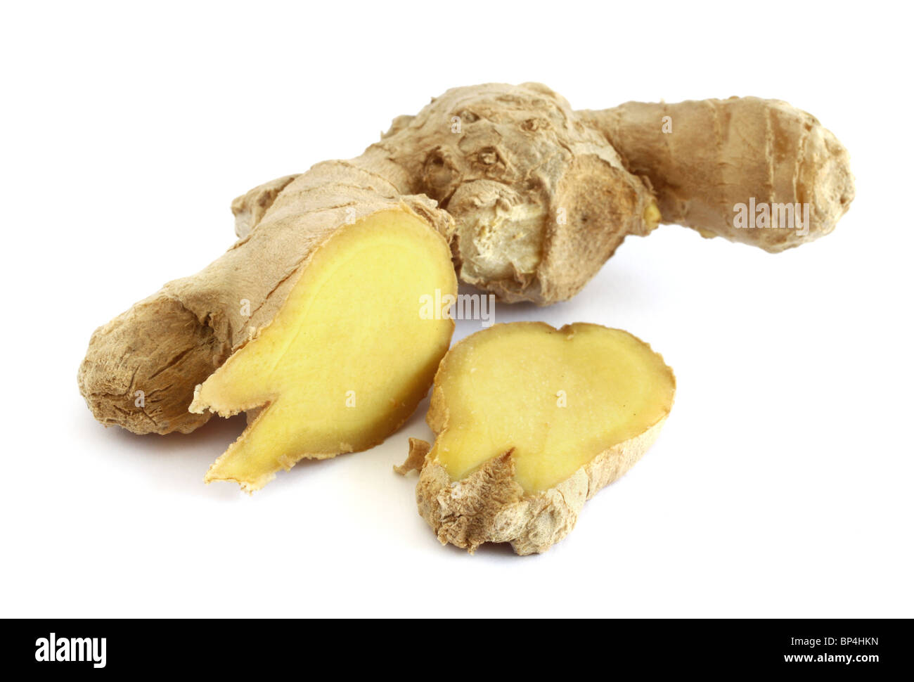 Ginger - whole piece of ginger and slice, isolated over white ...