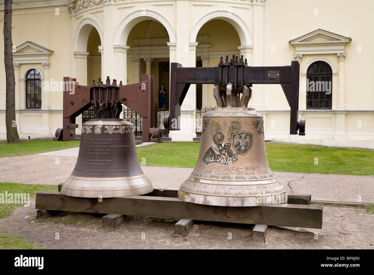 Large church bells in the garden of St. Ann's Church, Wilanow, Warsaw ...
