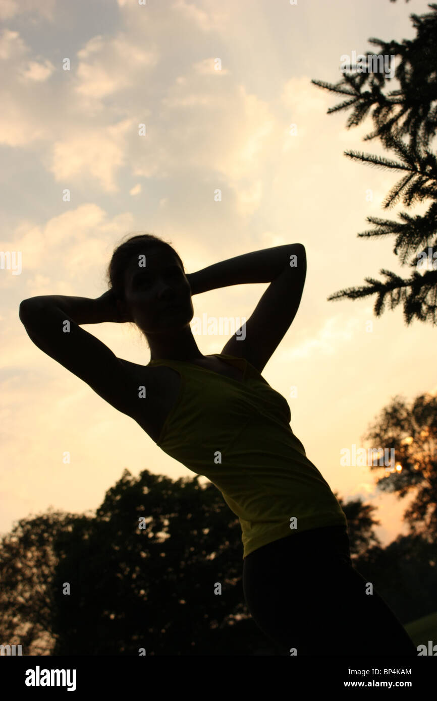 female silhouette outdoor park sunset Stock Photo - Alamy