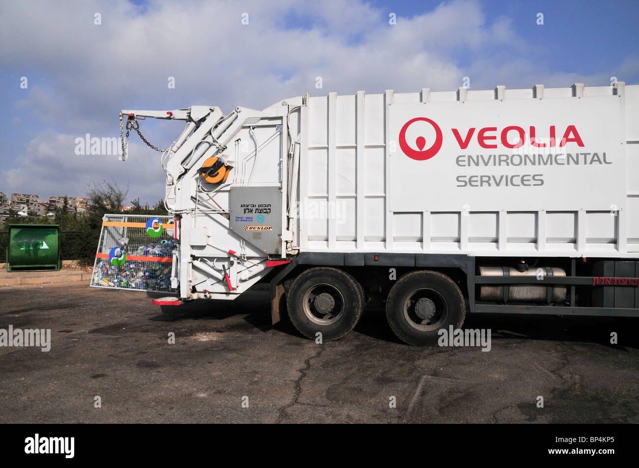 Truck collects plastic bottles for recycling Stock Photo - Alamy