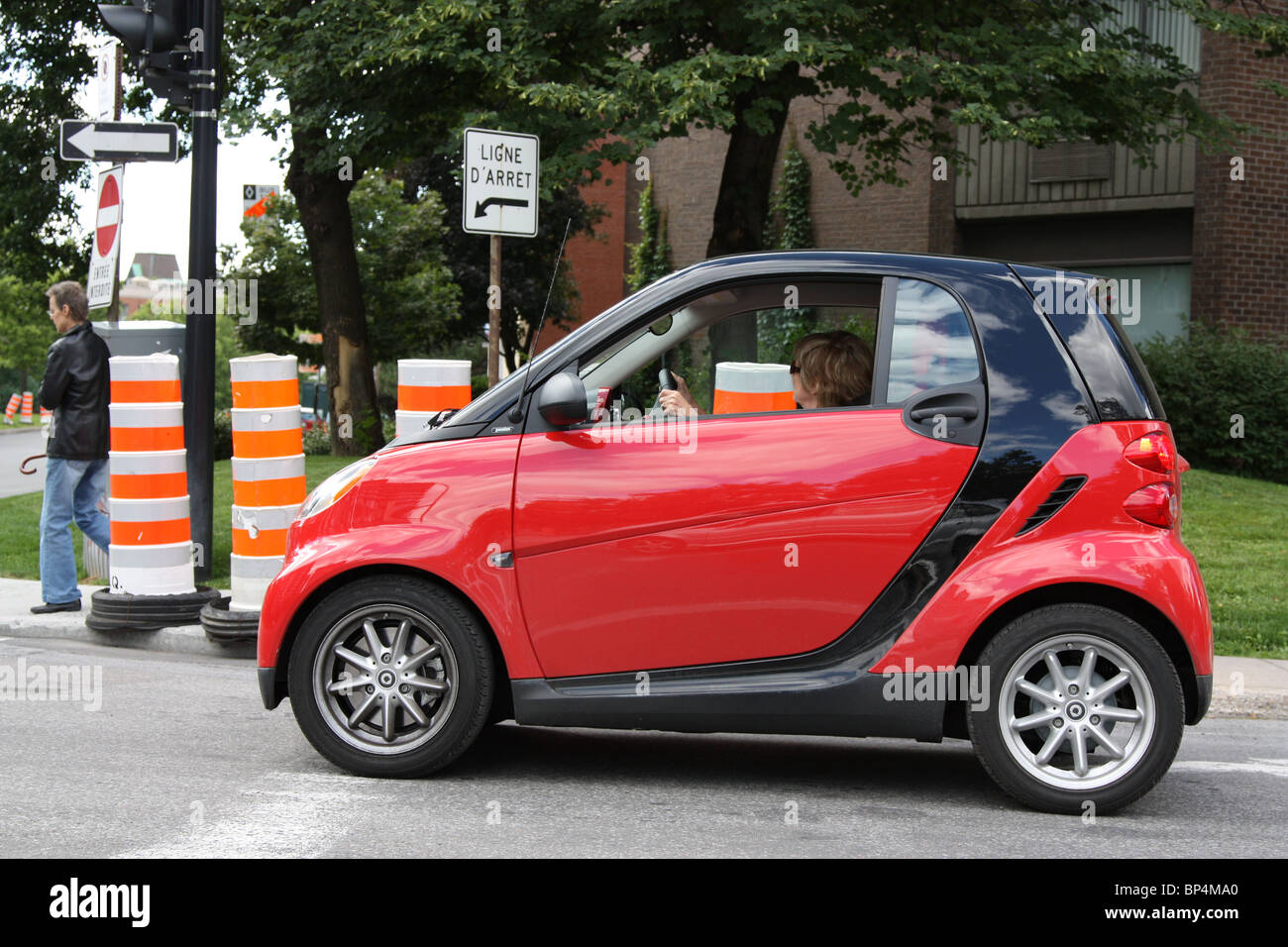 red smart electric car street sunny Stock Photo - Alamy