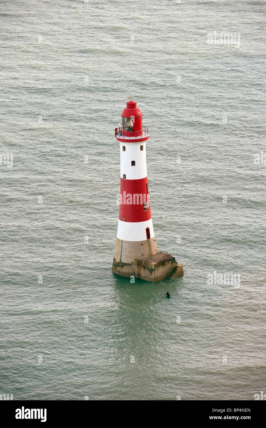 Beachy head lighthouse in the sea in the English channel off the South ...