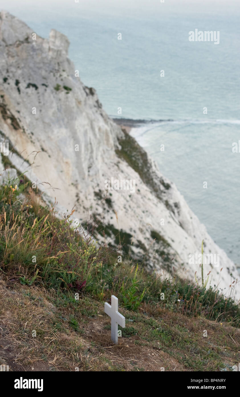 Memorial cross on top of chalk cliffs in memory of those who have ...