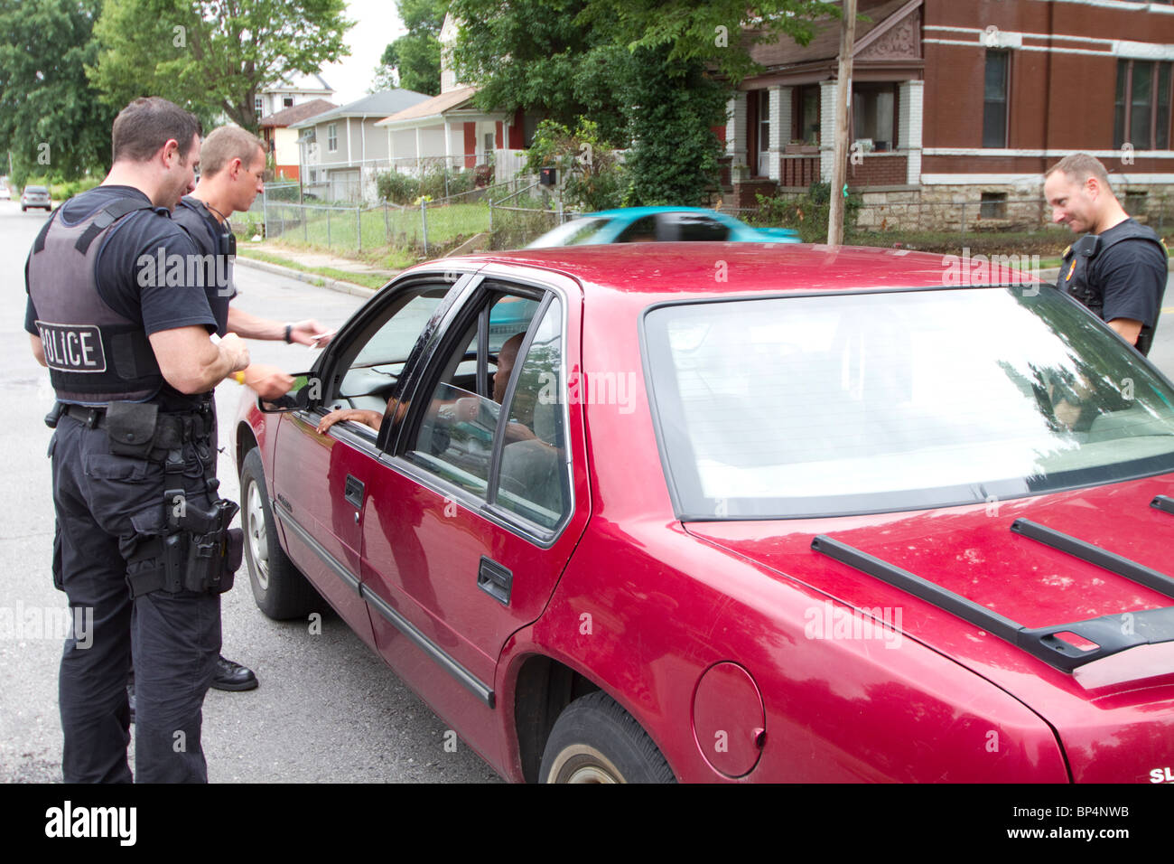 Police officers talking to citizen hi-res stock photography and images ...