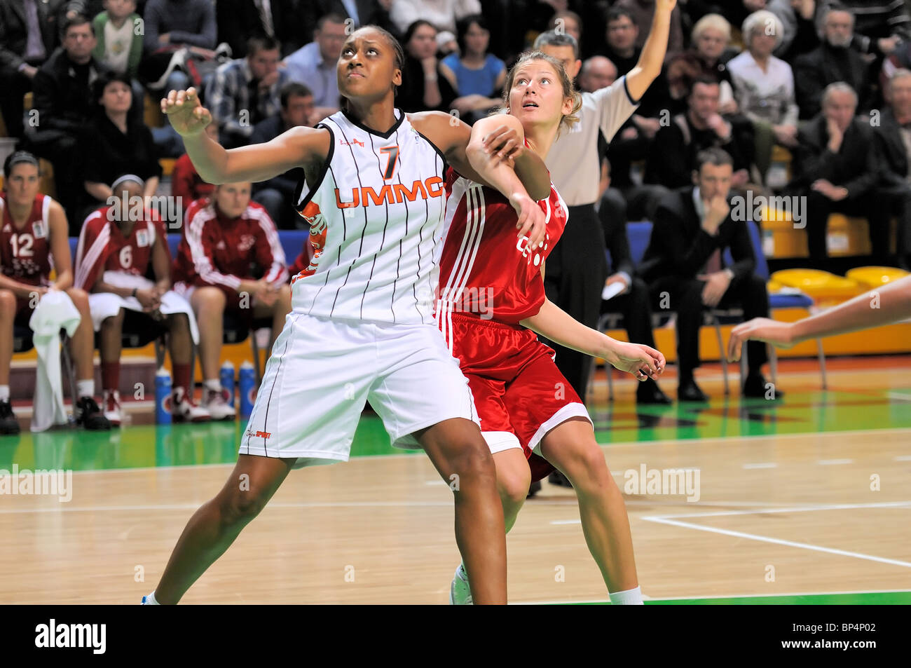 Sandrine Gruda #7 competes with Giedre Paugaite #11 Stock Photo - Alamy