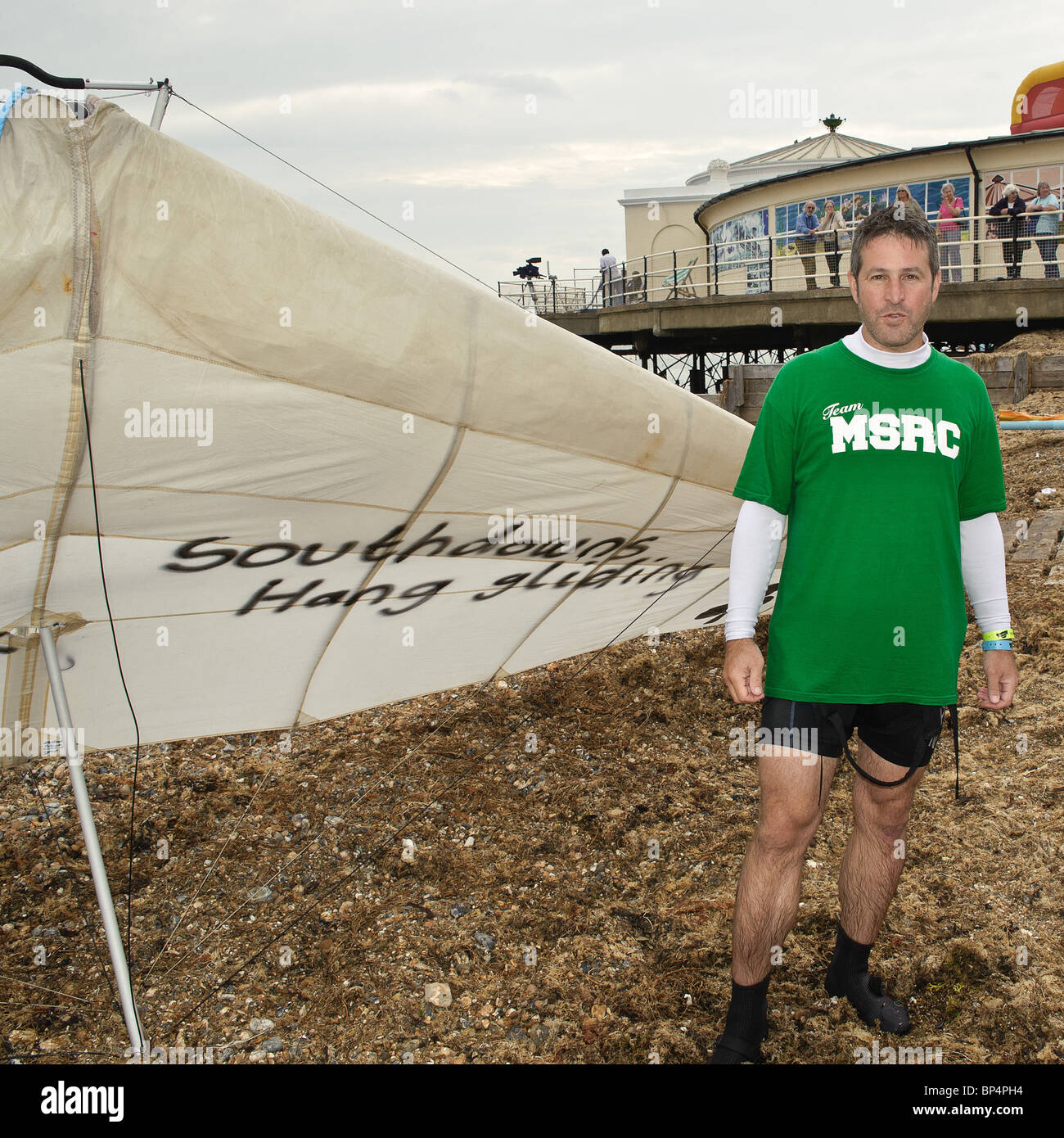 Worthing Birdman 2010 winner Toby Quantrill next to his glider ...