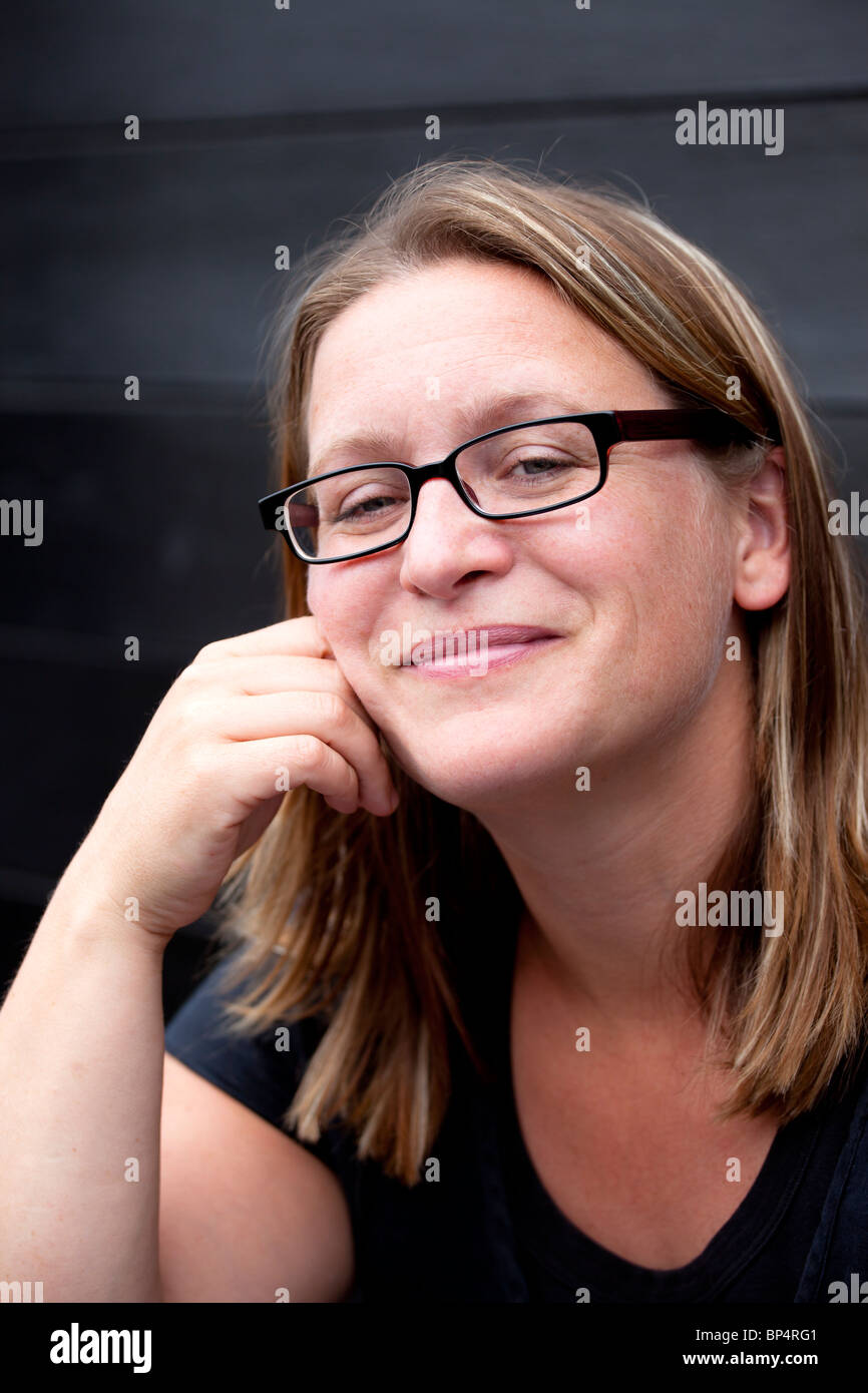 Portrait of a smiling, natural woman Stock Photo - Alamy