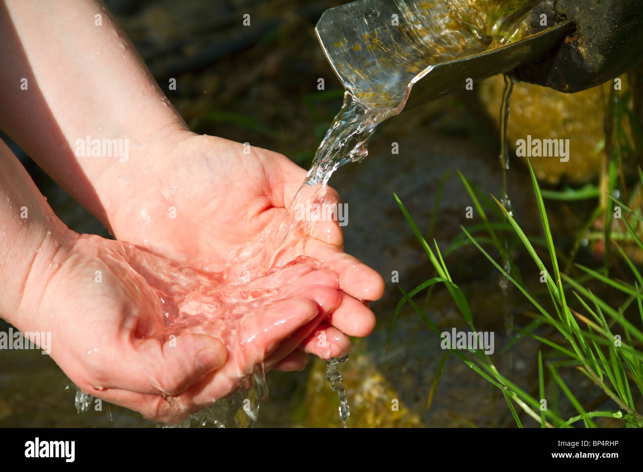 water in hand Stock Photo - Alamy