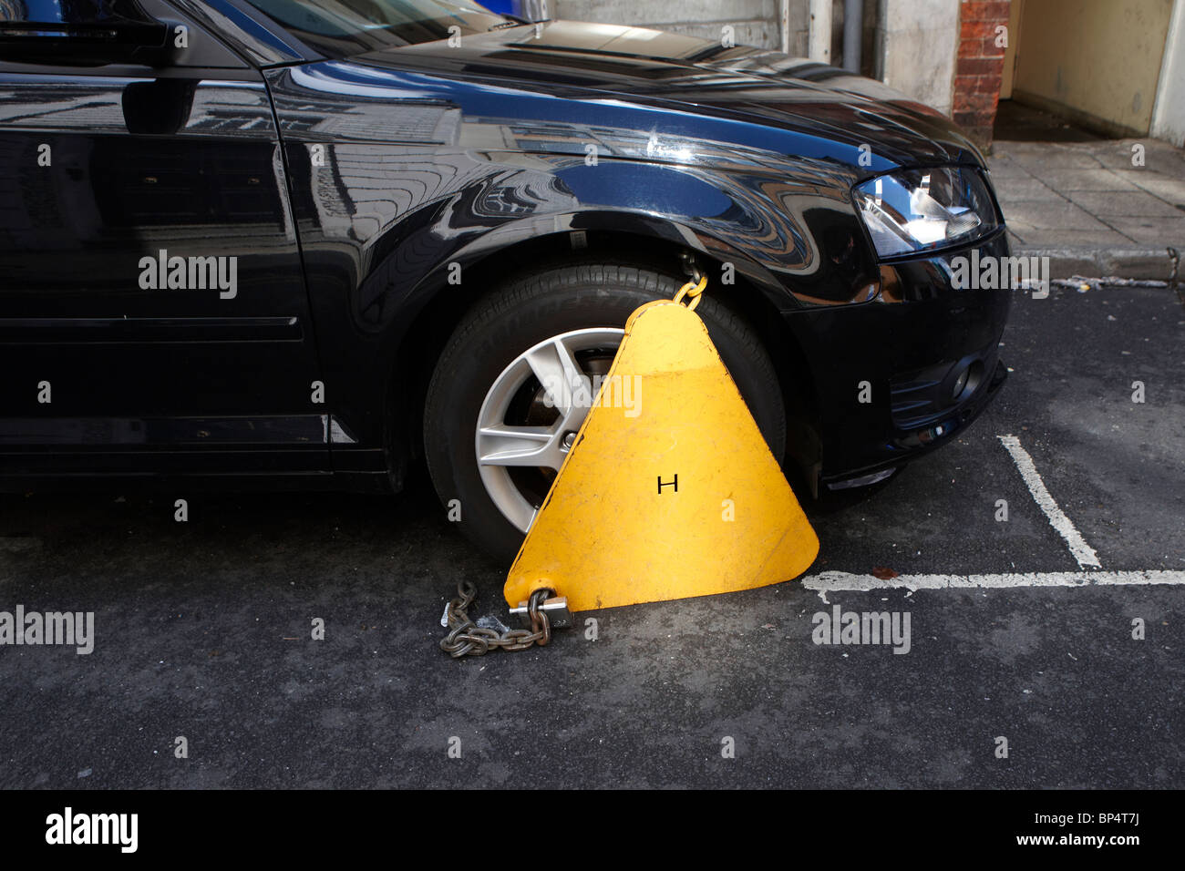 Black Audi A3 Wheel Clamped Stock Photo Alamy black-audi-a3-wheel-clamped-stock-photo-alamy