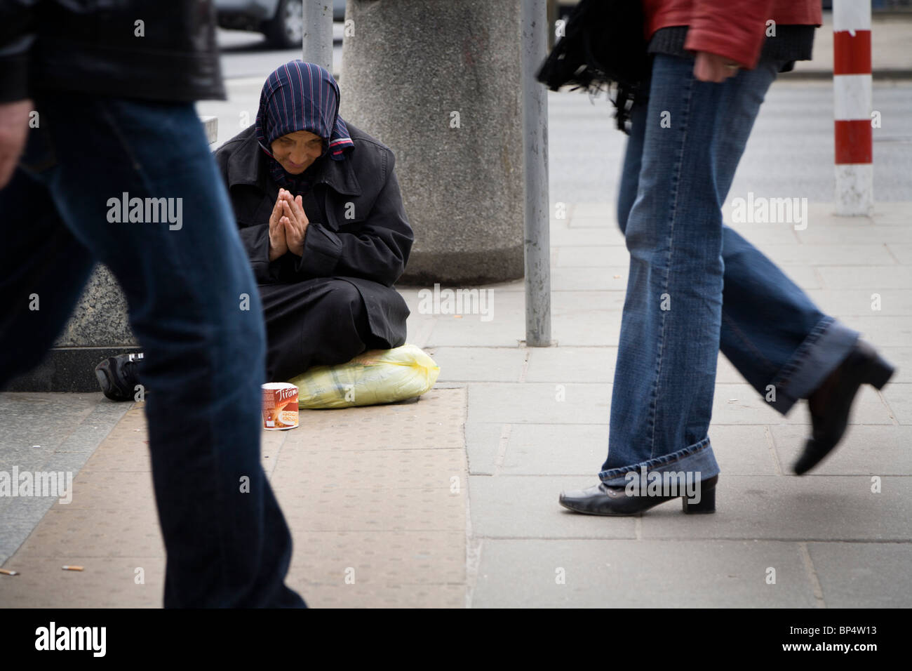 Female begging for money hi-res stock photography and images - Alamy