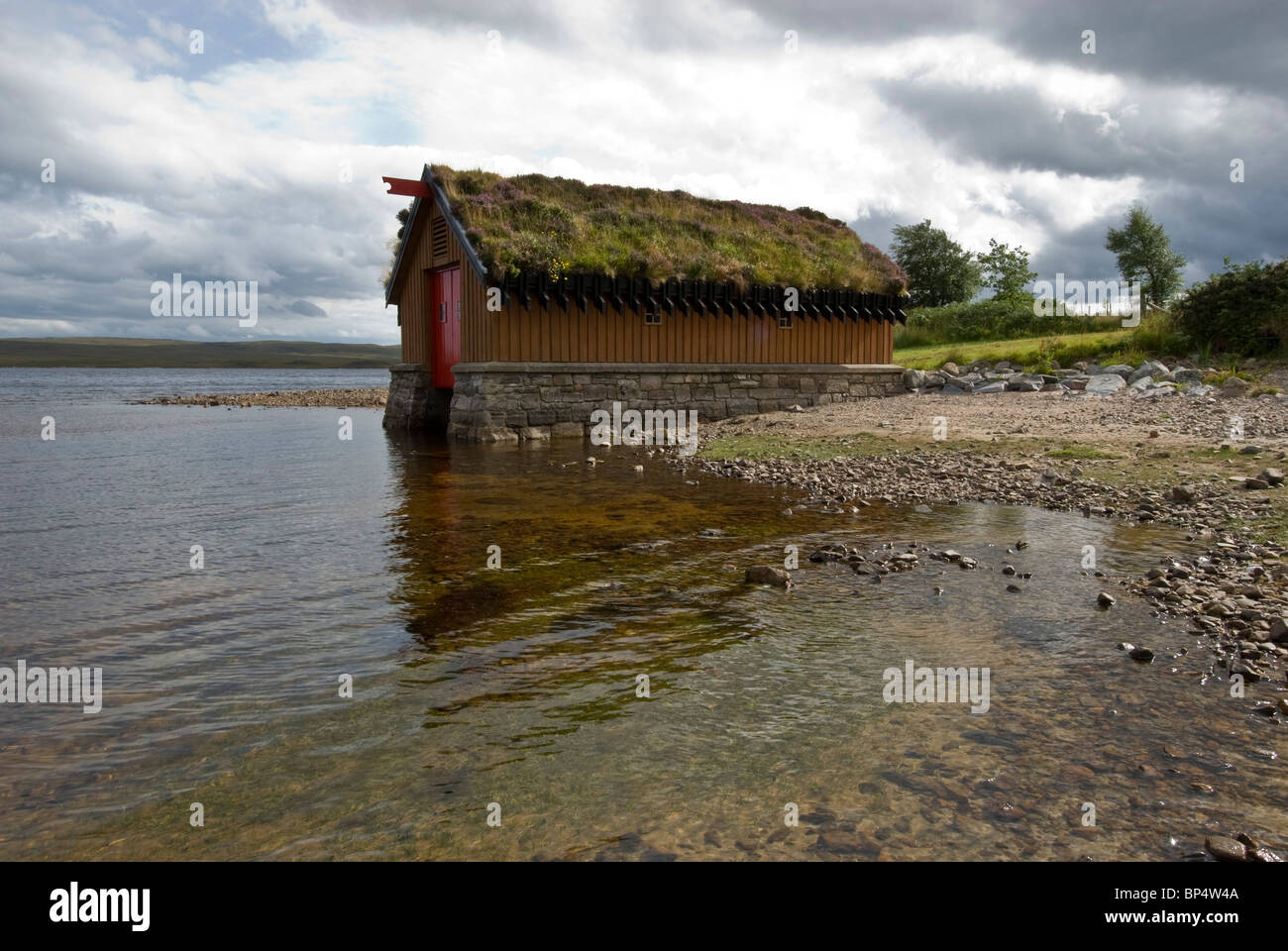 Sutherland scottish traditional heather boathouse red door wild ...