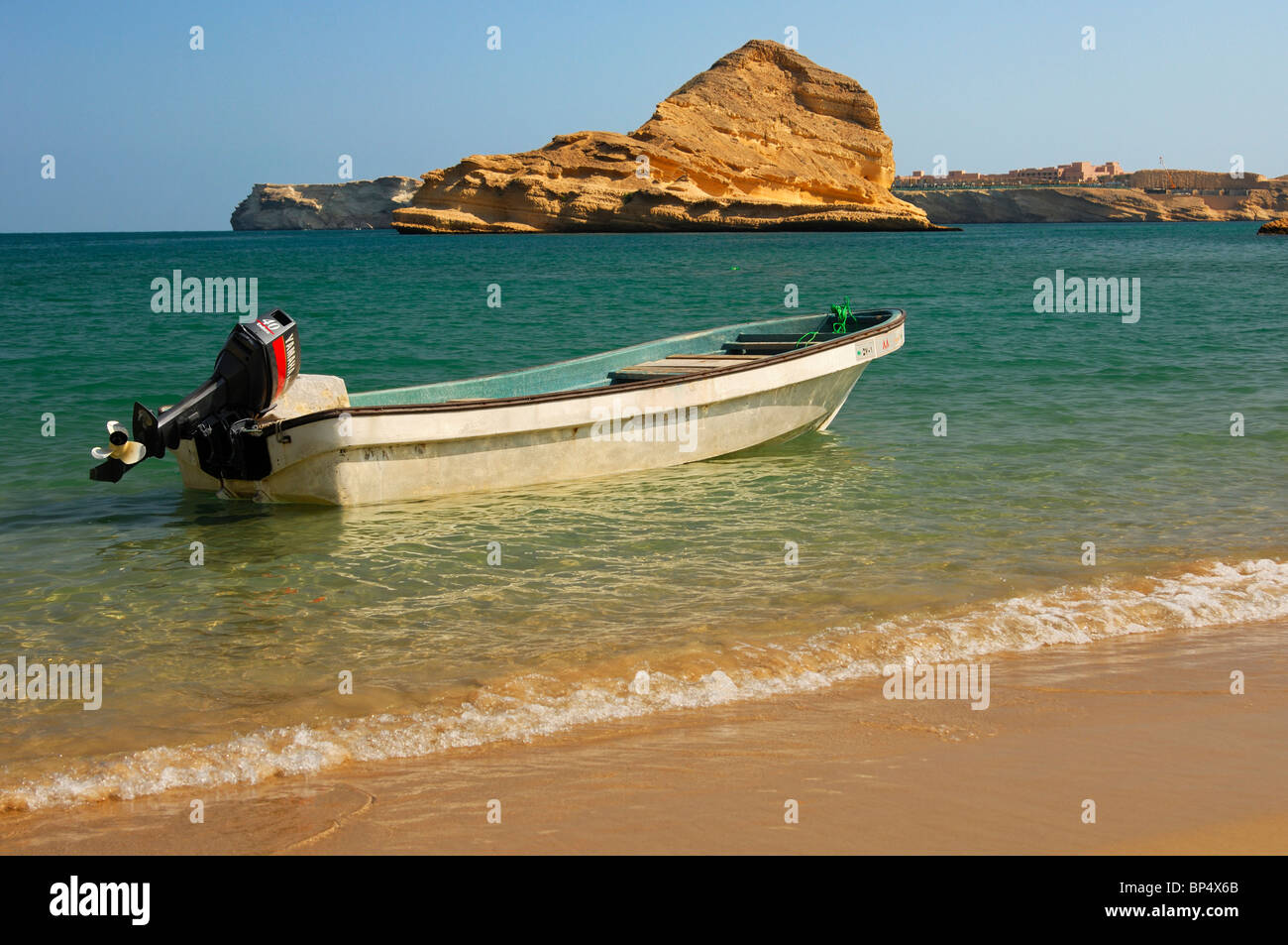 Motor-boat moored on the Quantab beach in the picturesque Barr Al ...