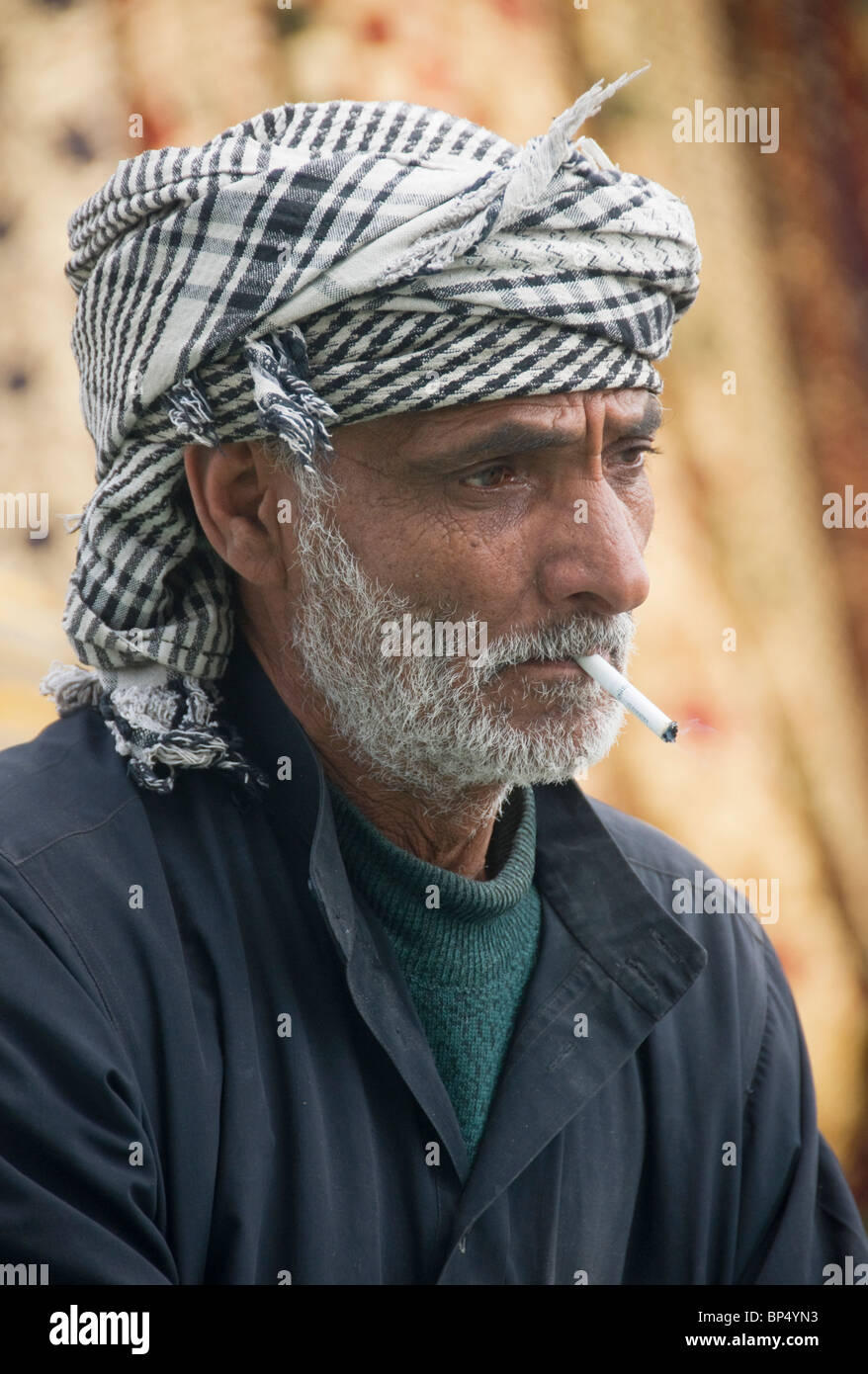 Muslim smoking cigarette hi-res stock photography and images - Alamy