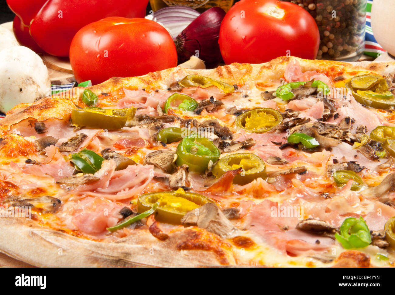 Very hot pizza with different kinds of pepper Stock Photo - Alamy
