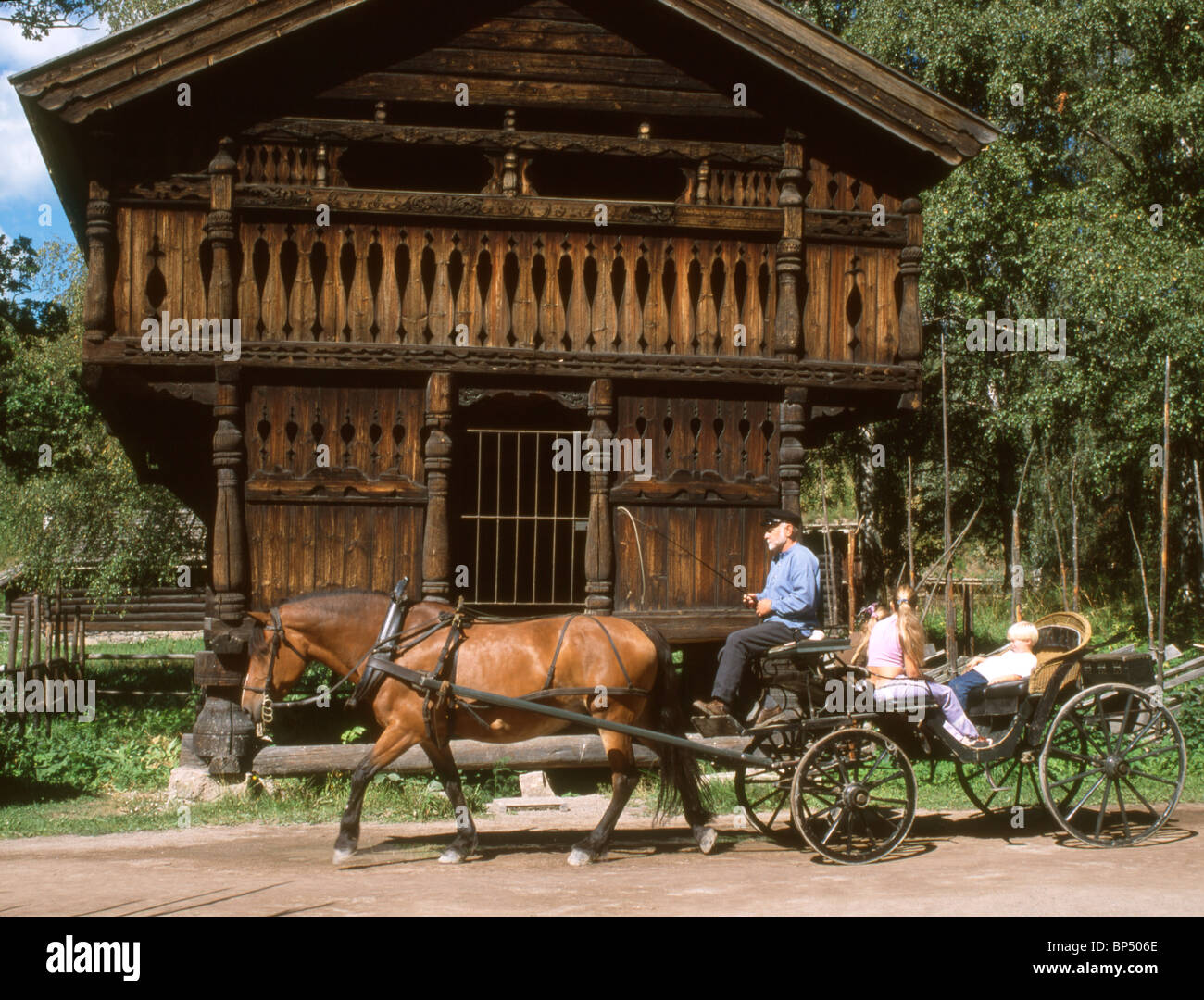 Norway Oslo Bygdøy Folk museum, stabbur, with horse & trap Stock Photo ...