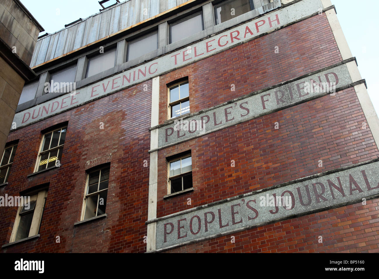 Side of old Fleet Street press building showing the names of old ...