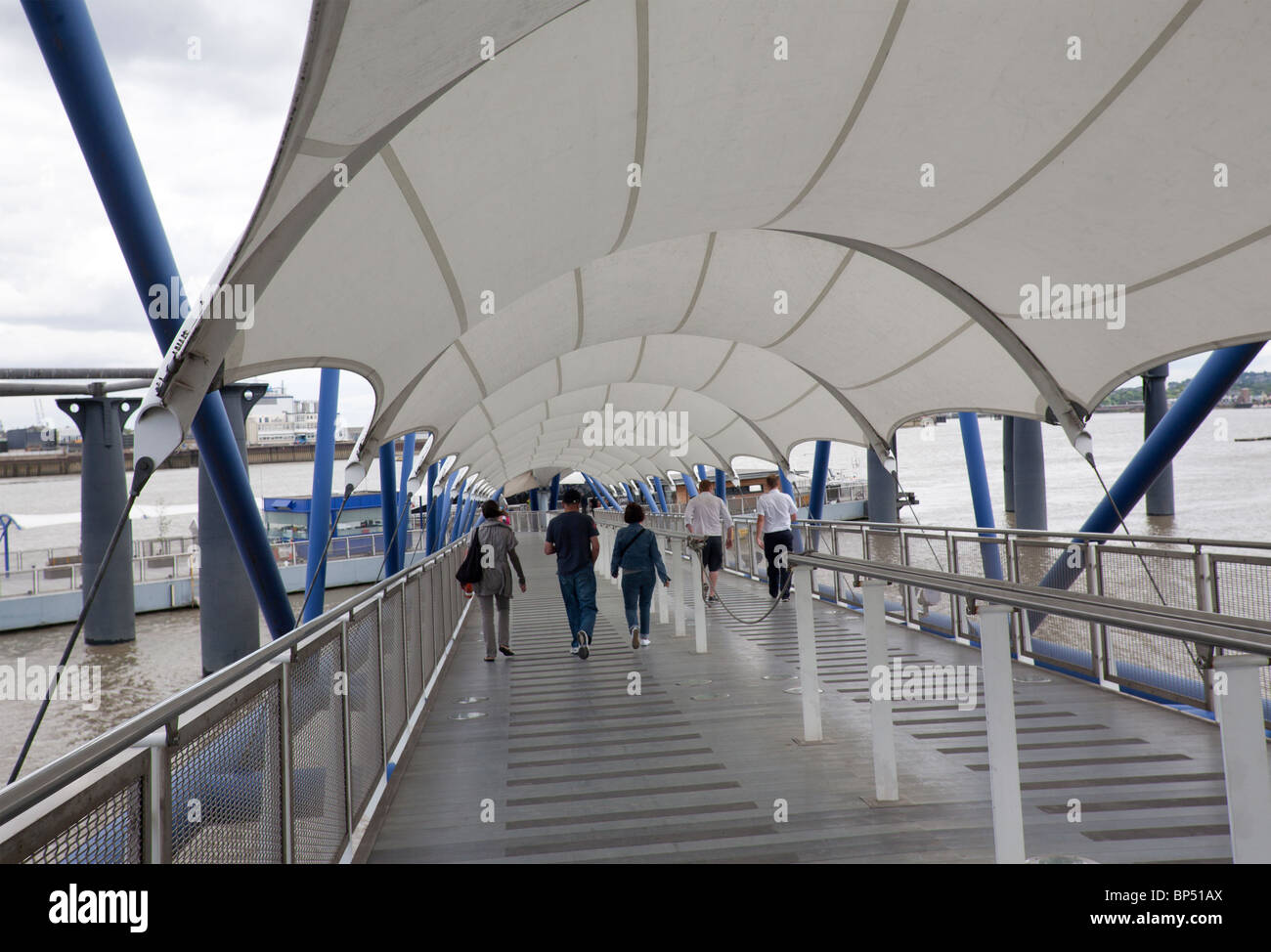 North Greenwich Pier walkway to Thames Clipper Service Stock Photo - Alamy