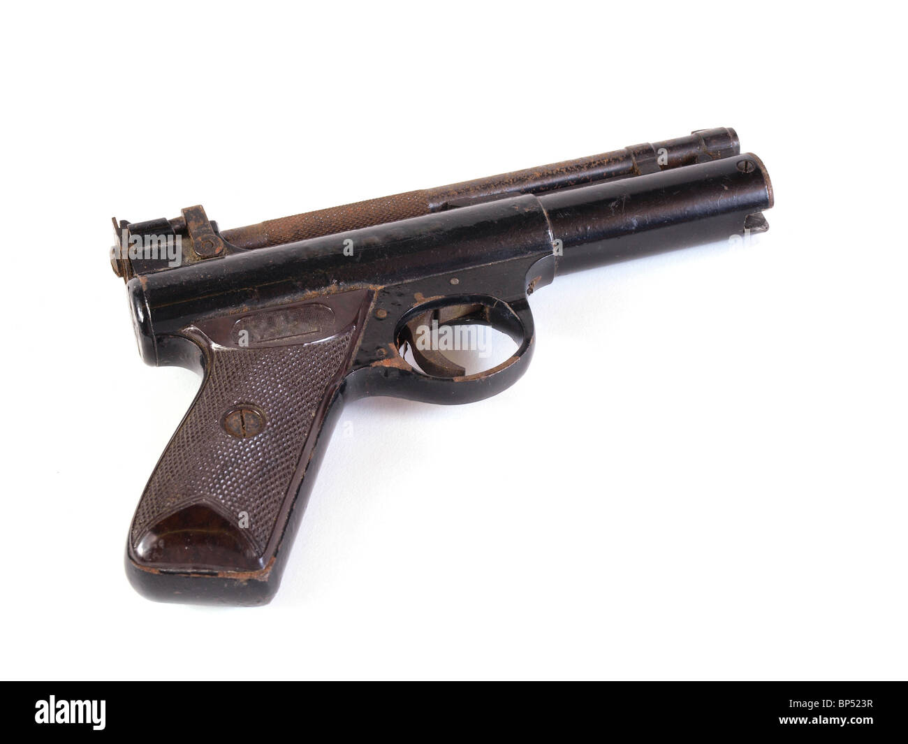 Old hand gun on a plain white background Stock Photo - Alamy