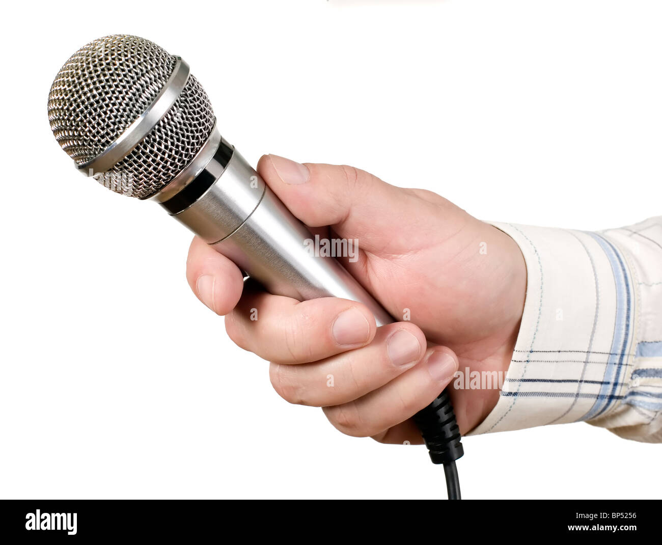 Man is holding modern microphone with wire Stock Photo - Alamy