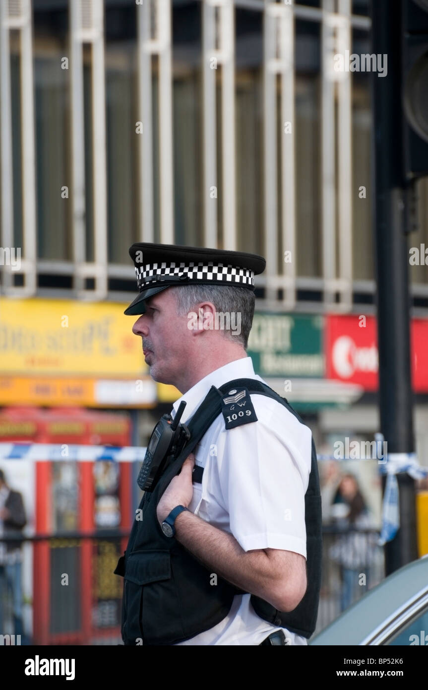 Portrait in profile of London Metropolitan Policemen, England, UK ...