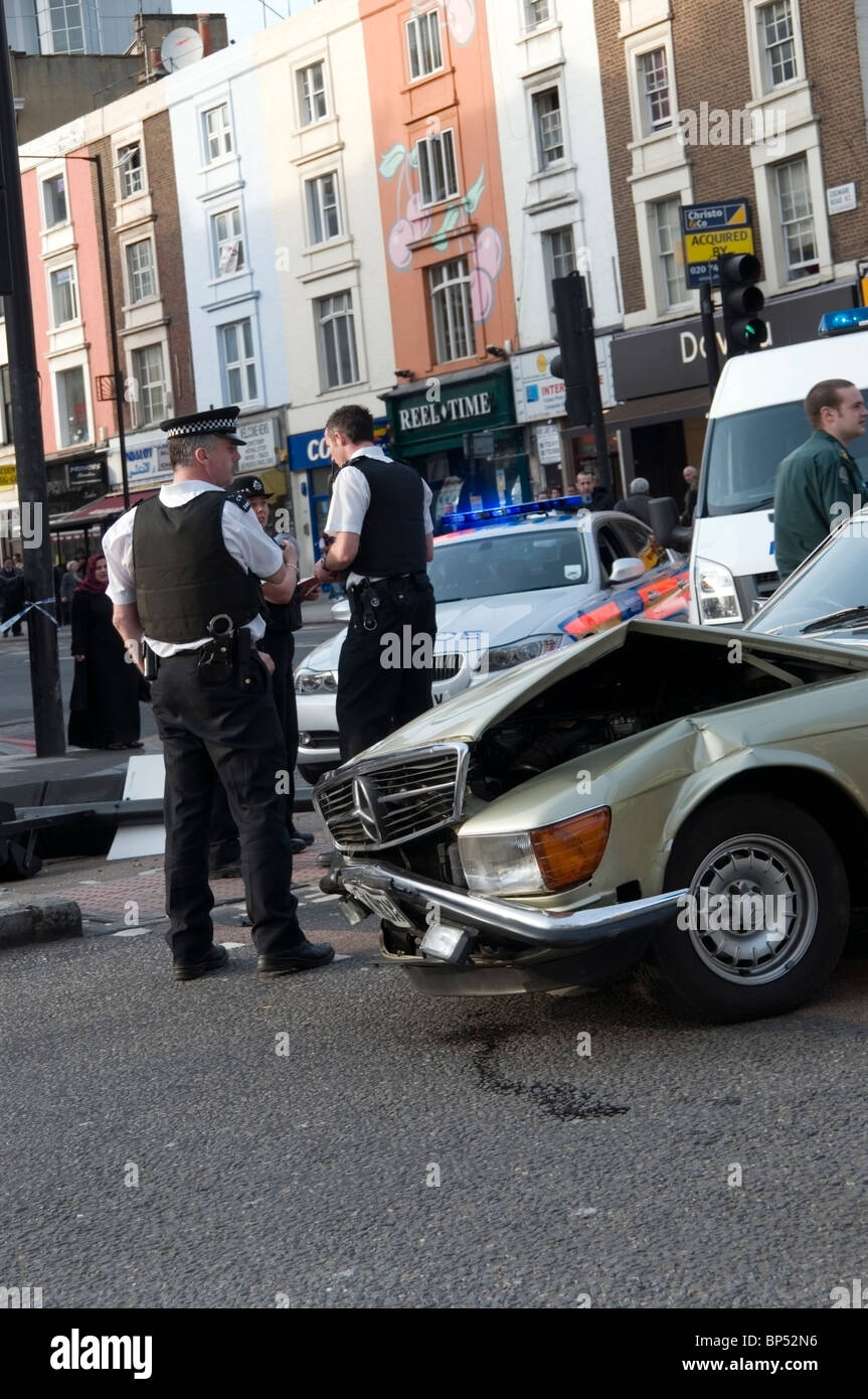 London Metropolitan Police attending Road accident scene, England, UK ...