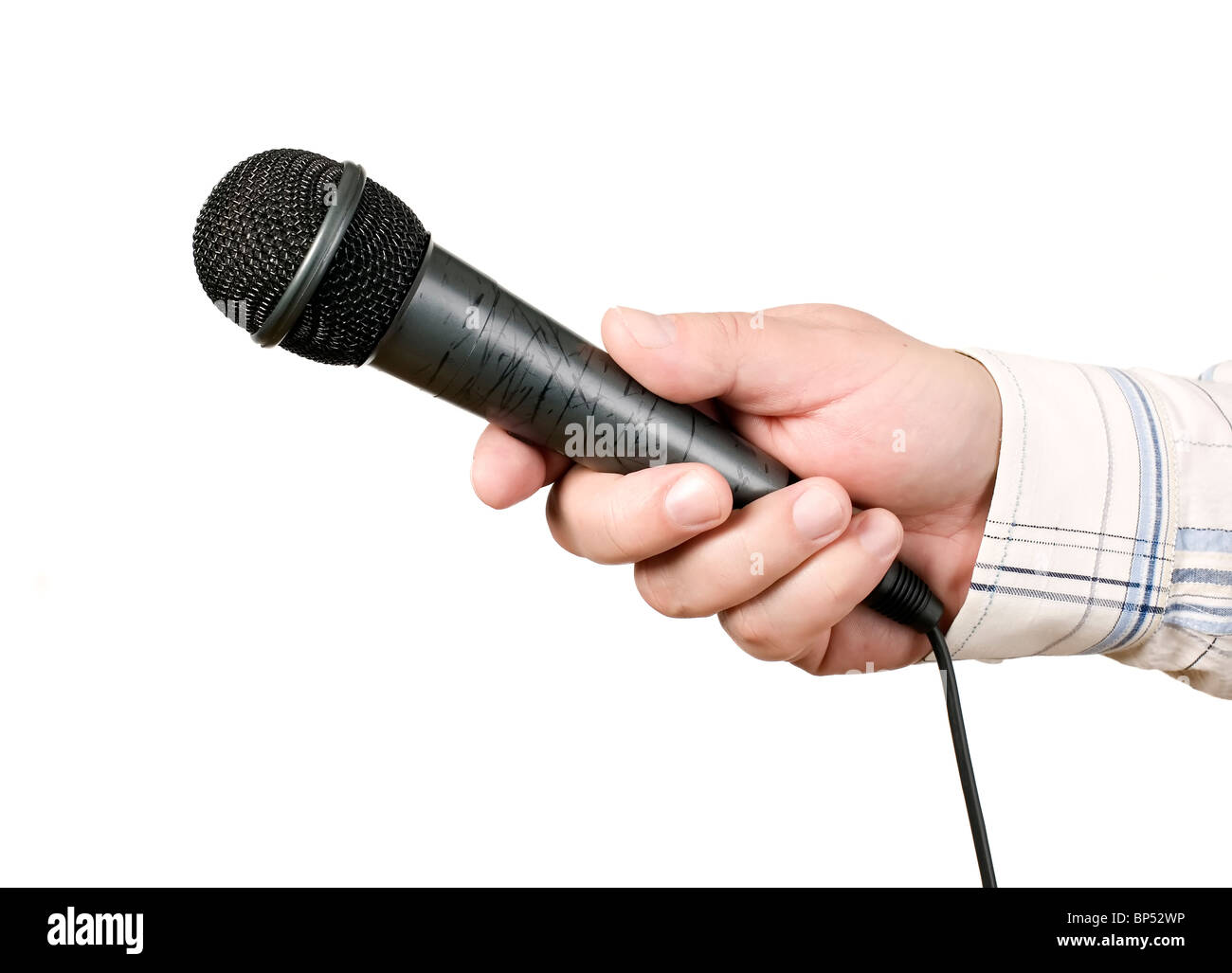 Man is holding modern microphone with wire Stock Photo - Alamy