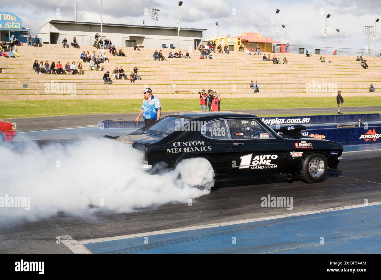 Drag racing Ford Capri performing a massive tyre smoking burnout at ...