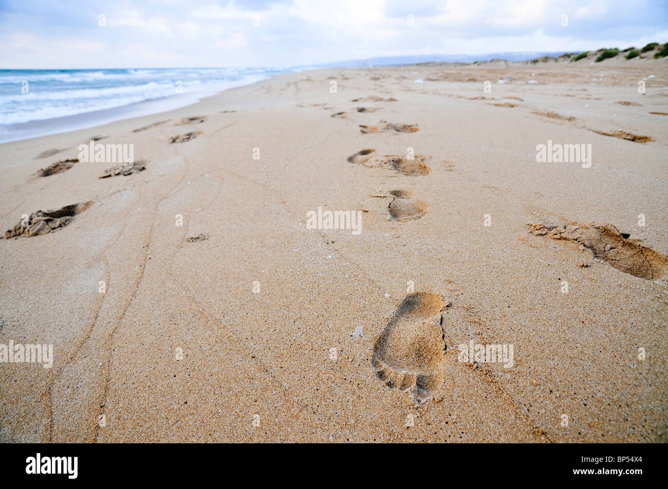 Israel, Atlit, Human footsteps in the sand Stock Photo - Alamy