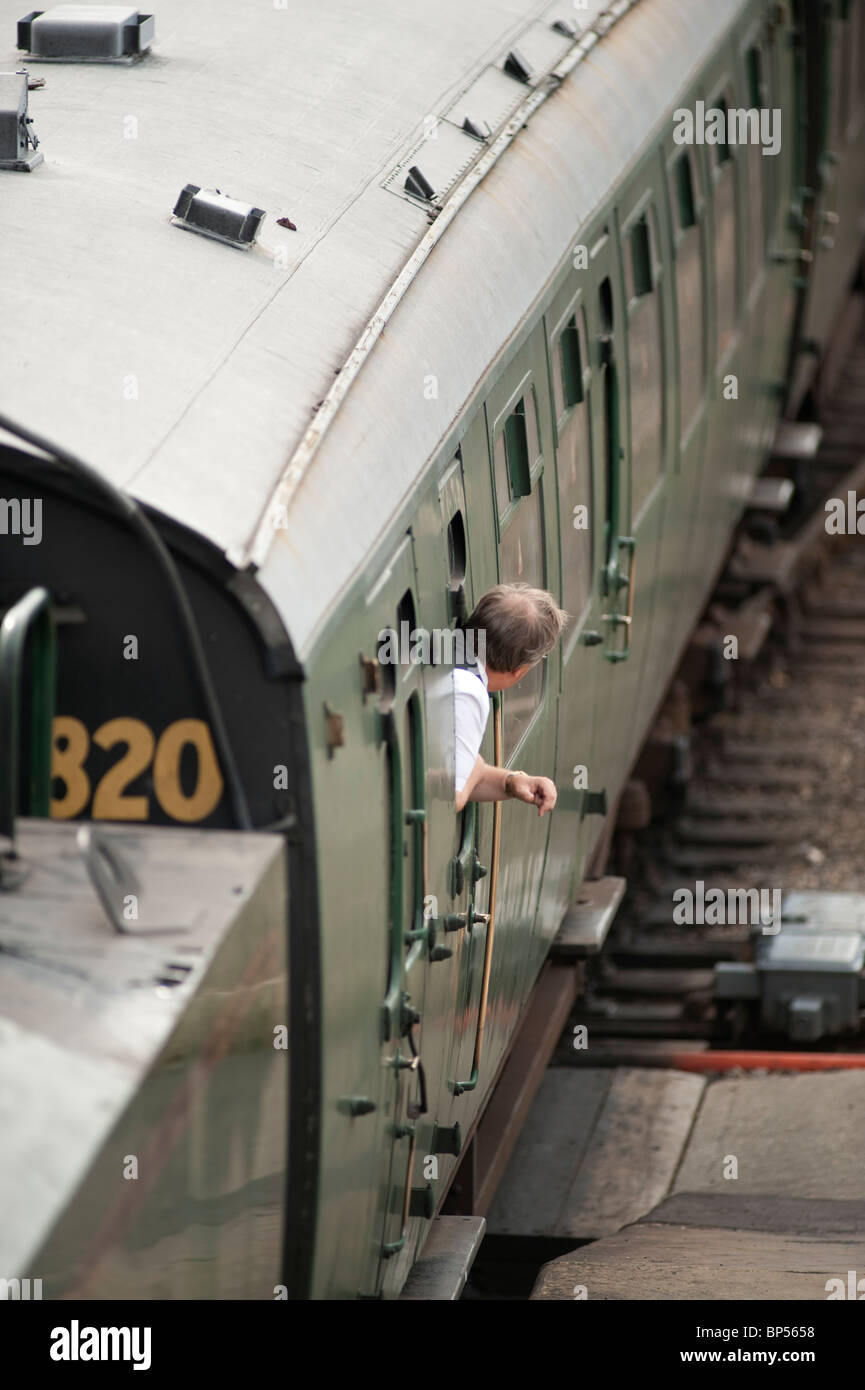 The Bluebell Railway, Man Looking out Coach Stock Photo - Alamy