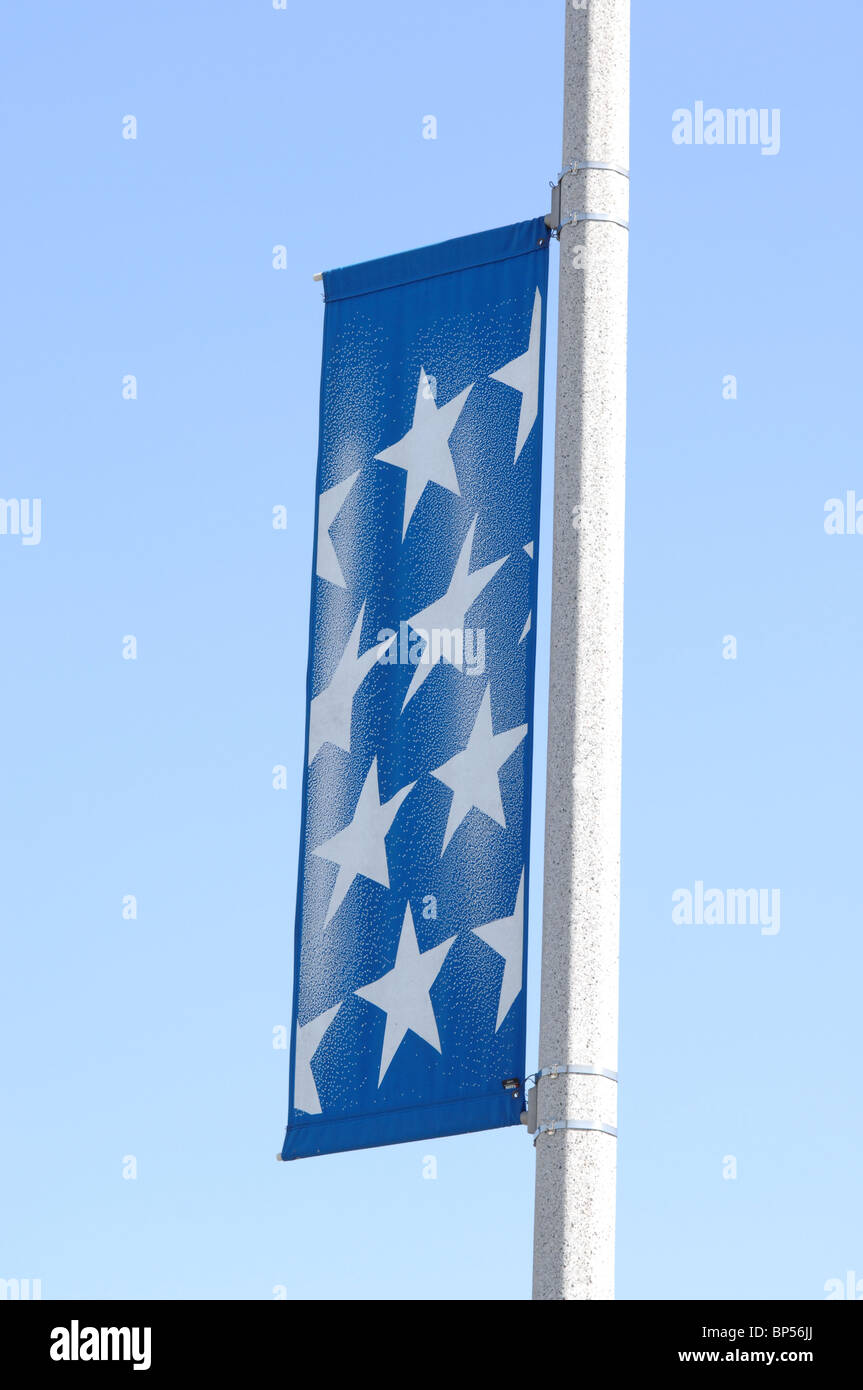 Stars on a sign mounted to an overhead light pole centered Stock Photo ...