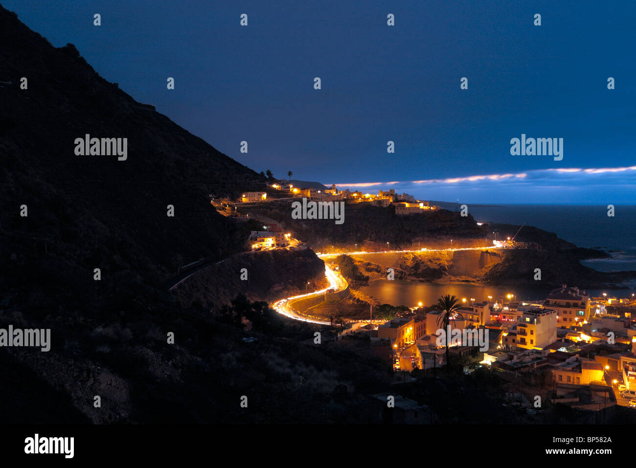 View over the port of Garachico to San Pedro and the disappearing light ...
