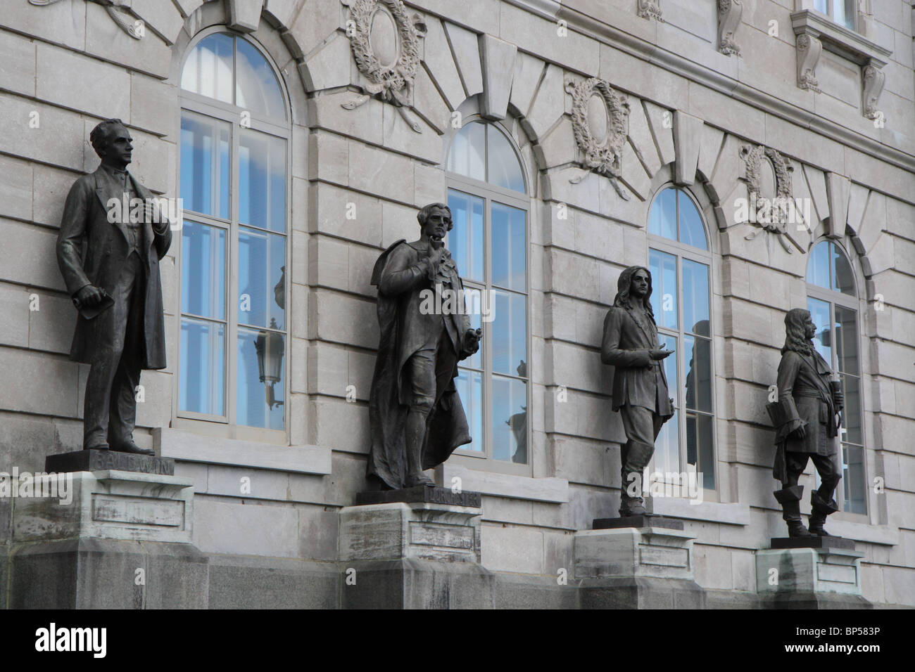 Statues in front of the parliament facade, Quebec city, Quebec, Canada ...
