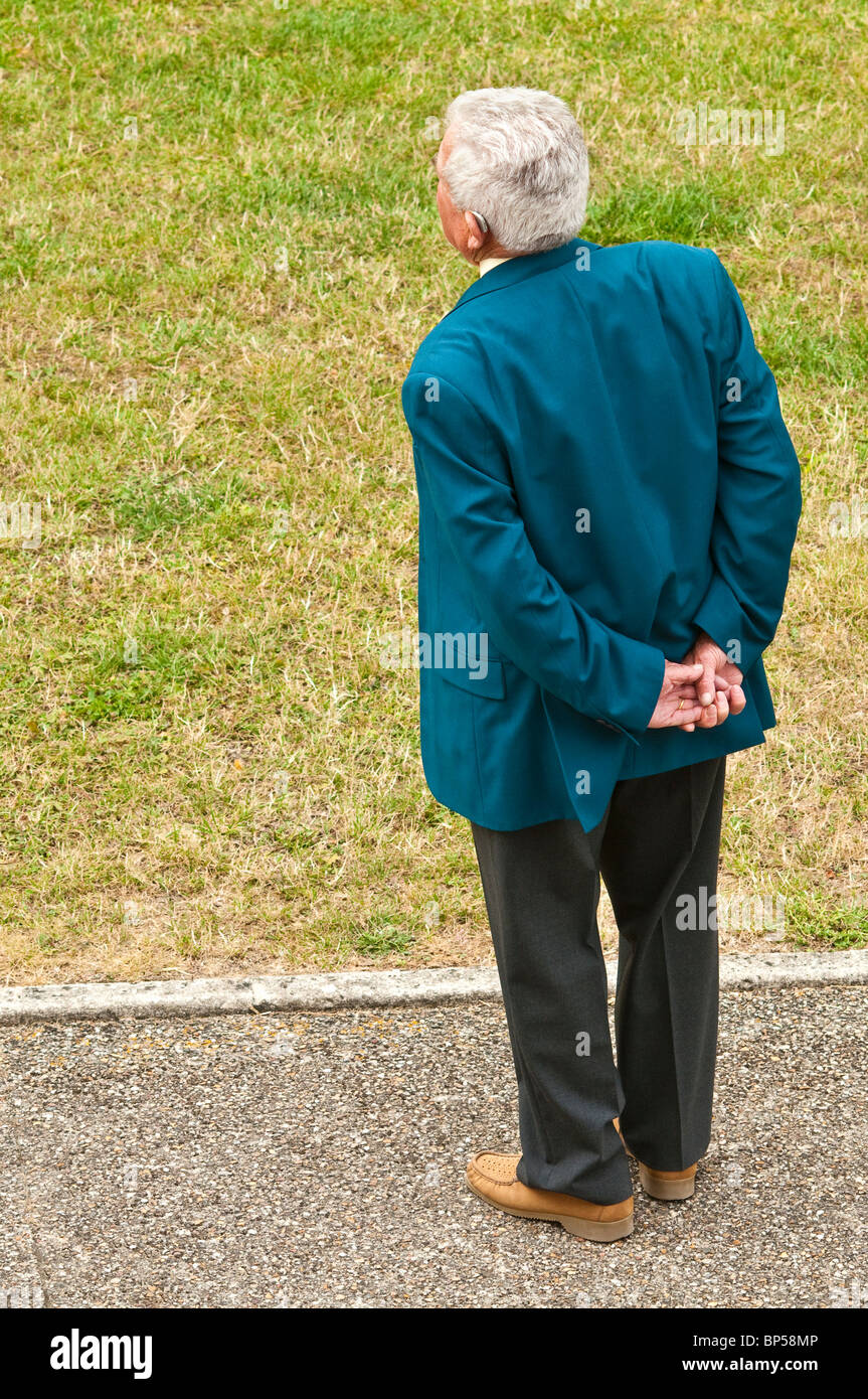 Overhead view of man standing and staring - France Stock Photo - Alamy