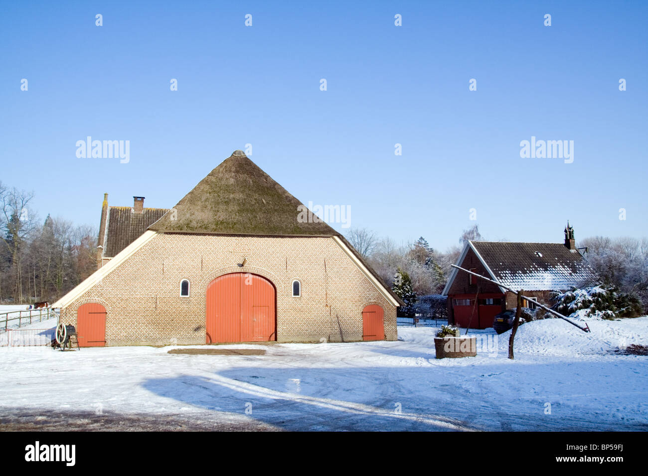 Old Dutch stable in Winter Stock Photo - Alamy