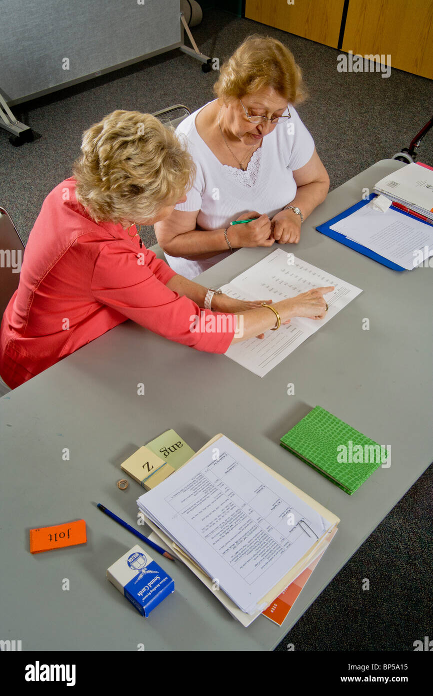 Using "word card" components to form a complete word, a volunteer adult ...