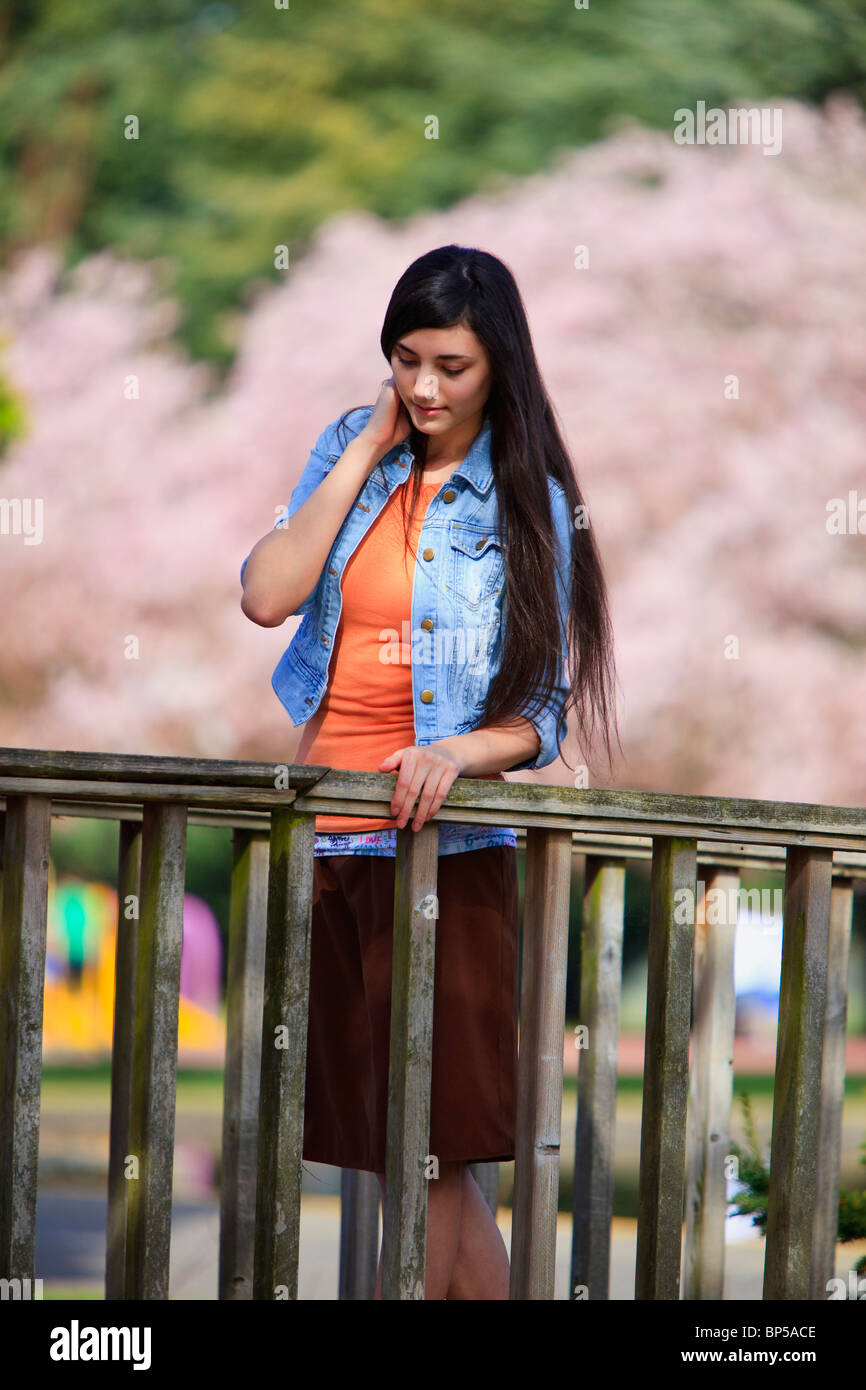 Portland, Oregon, United States Of America; A Teenage Girl Standing ...