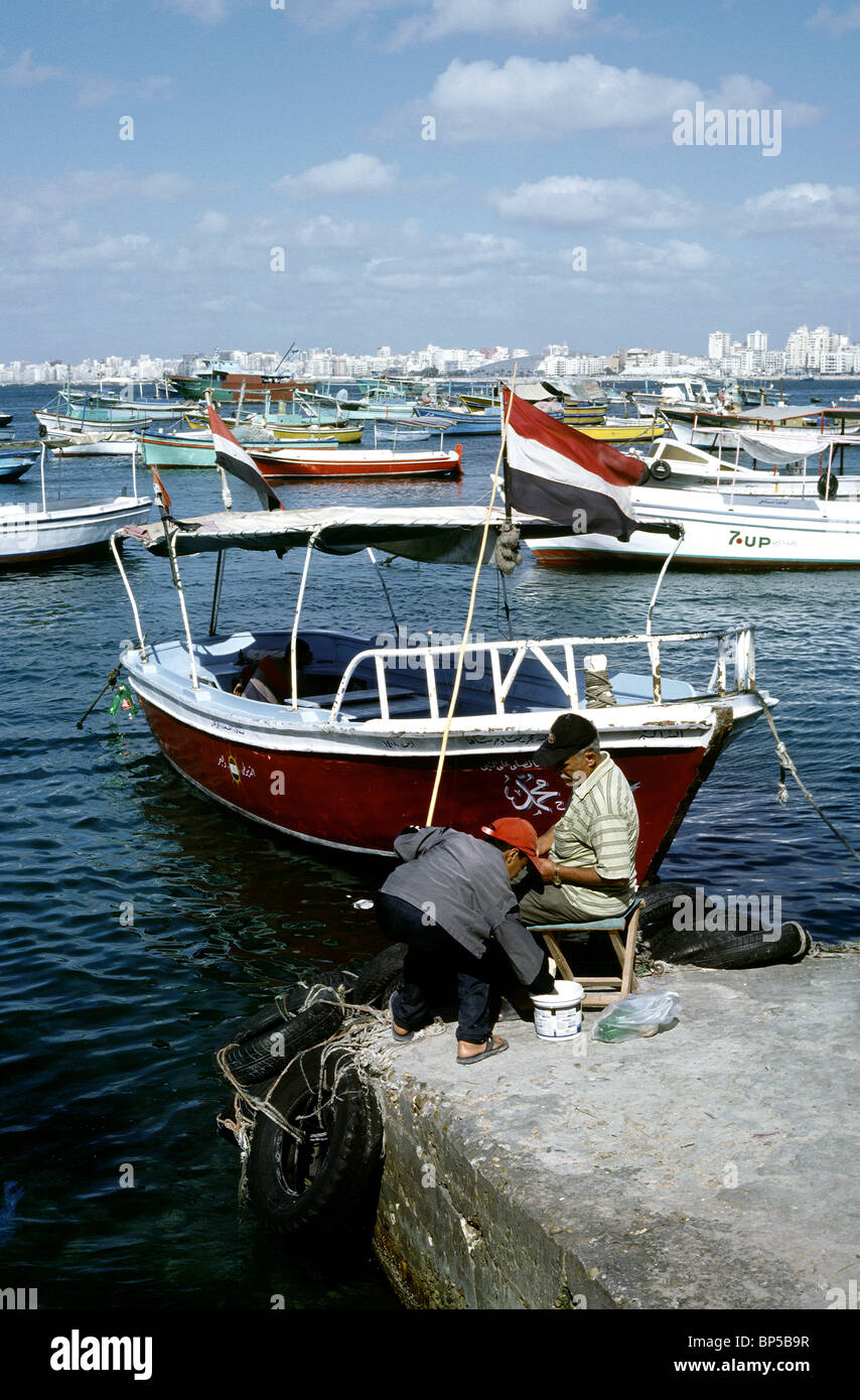 Grandfather and grandson fishing in Alexandria's Eastern Harbour Stock ...
