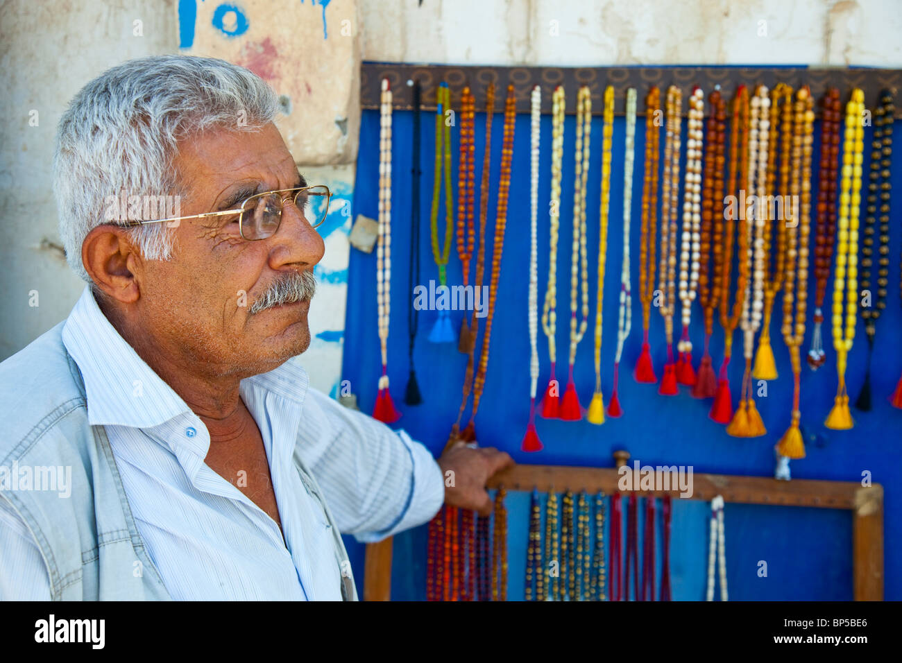 Muslim prayer bead vendor in the bazaar, Dohuk, Kurdistan, Iraq Stock ...