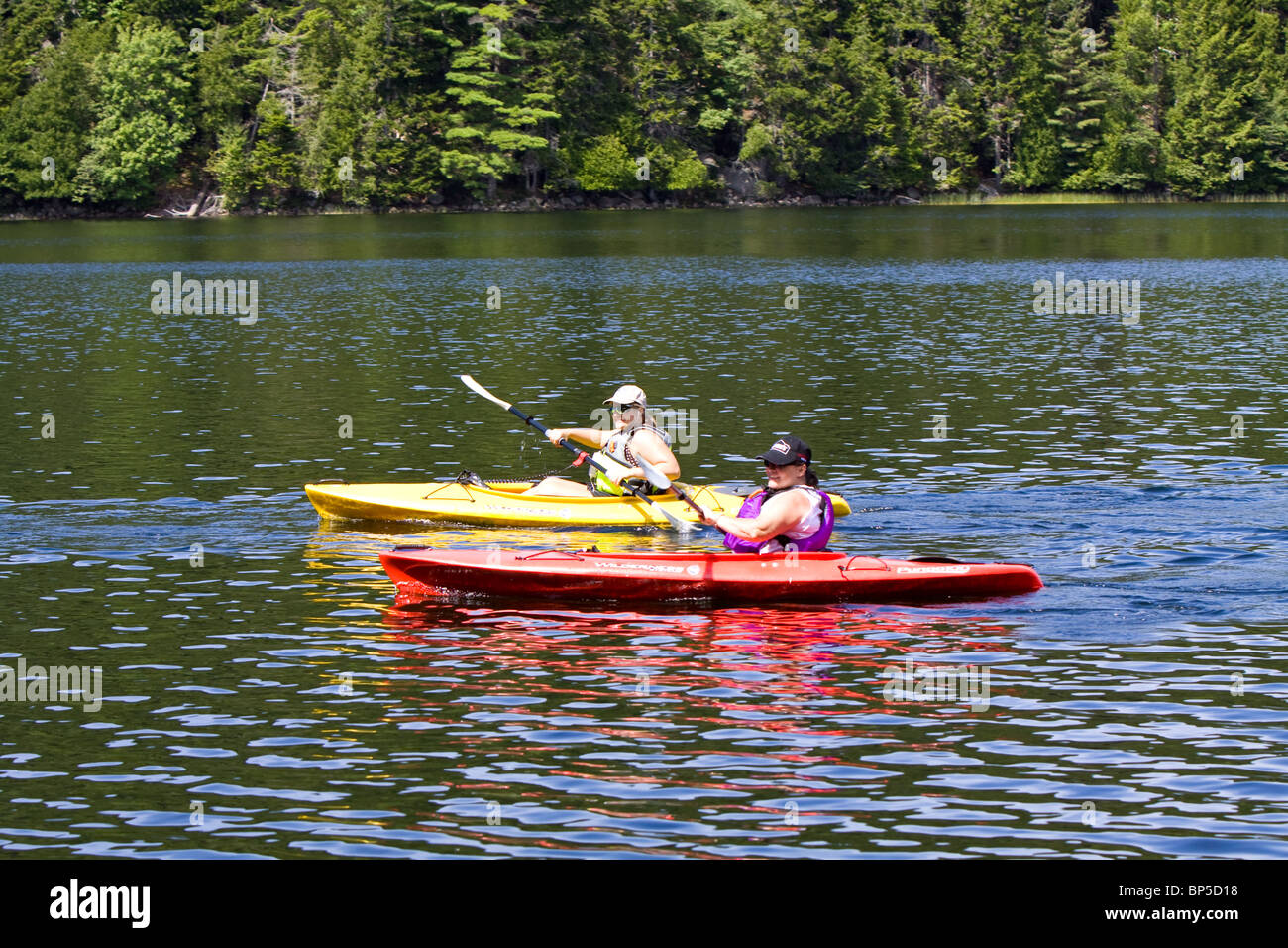 Two women on kayaks in Acadia National Park,Echo lake Stock Photo - Alamy