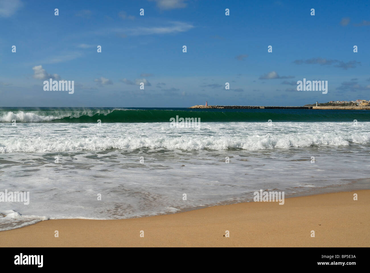 Waves breaking in beautiful blue hi-res stock photography and images ...