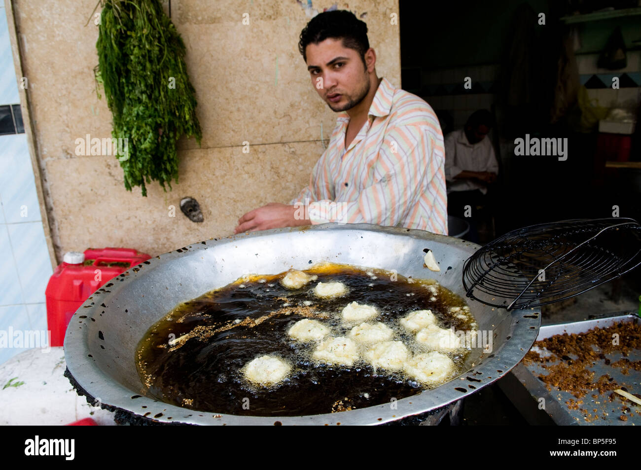 Egyptian Falafel - Ta'amia being fried in a fast food joint in Egypt ...