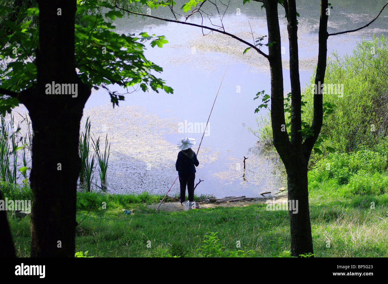 Lady fishing hi-res stock photography and images - Alamy