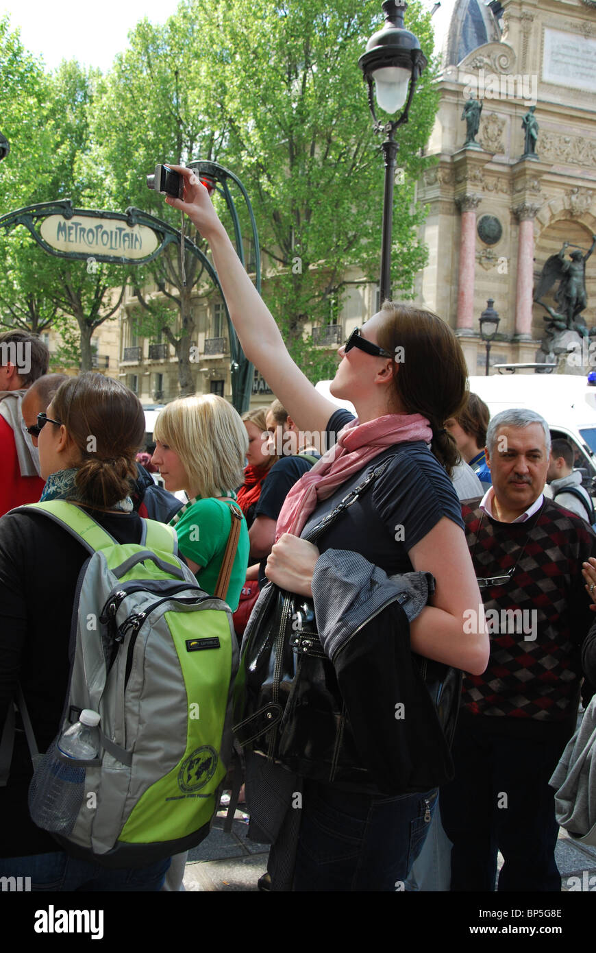 young woman taking snapshot of Parisian scene, France Stock Photo - Alamy