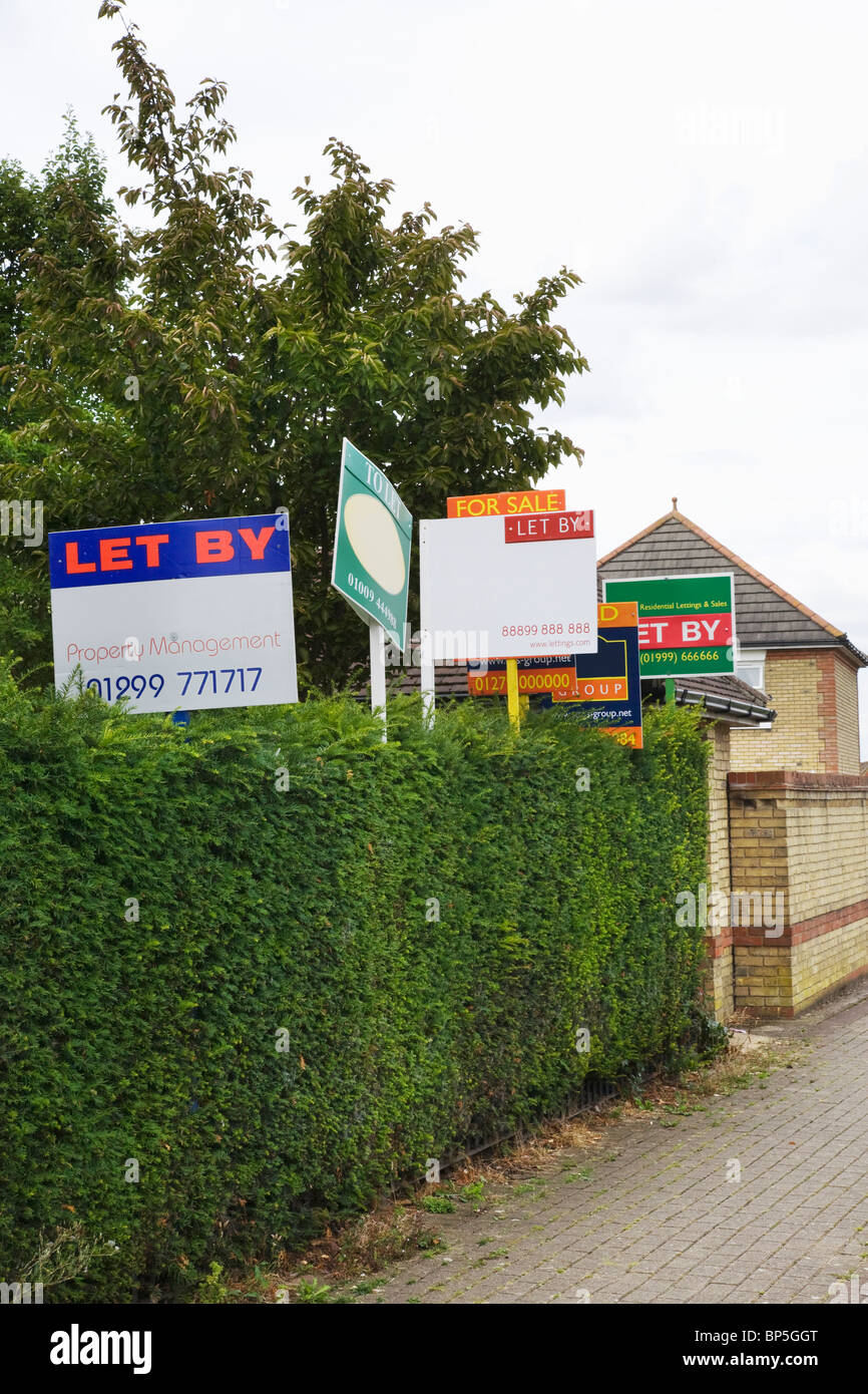 a group of Estate Agent Signs Stock Photo - Alamy