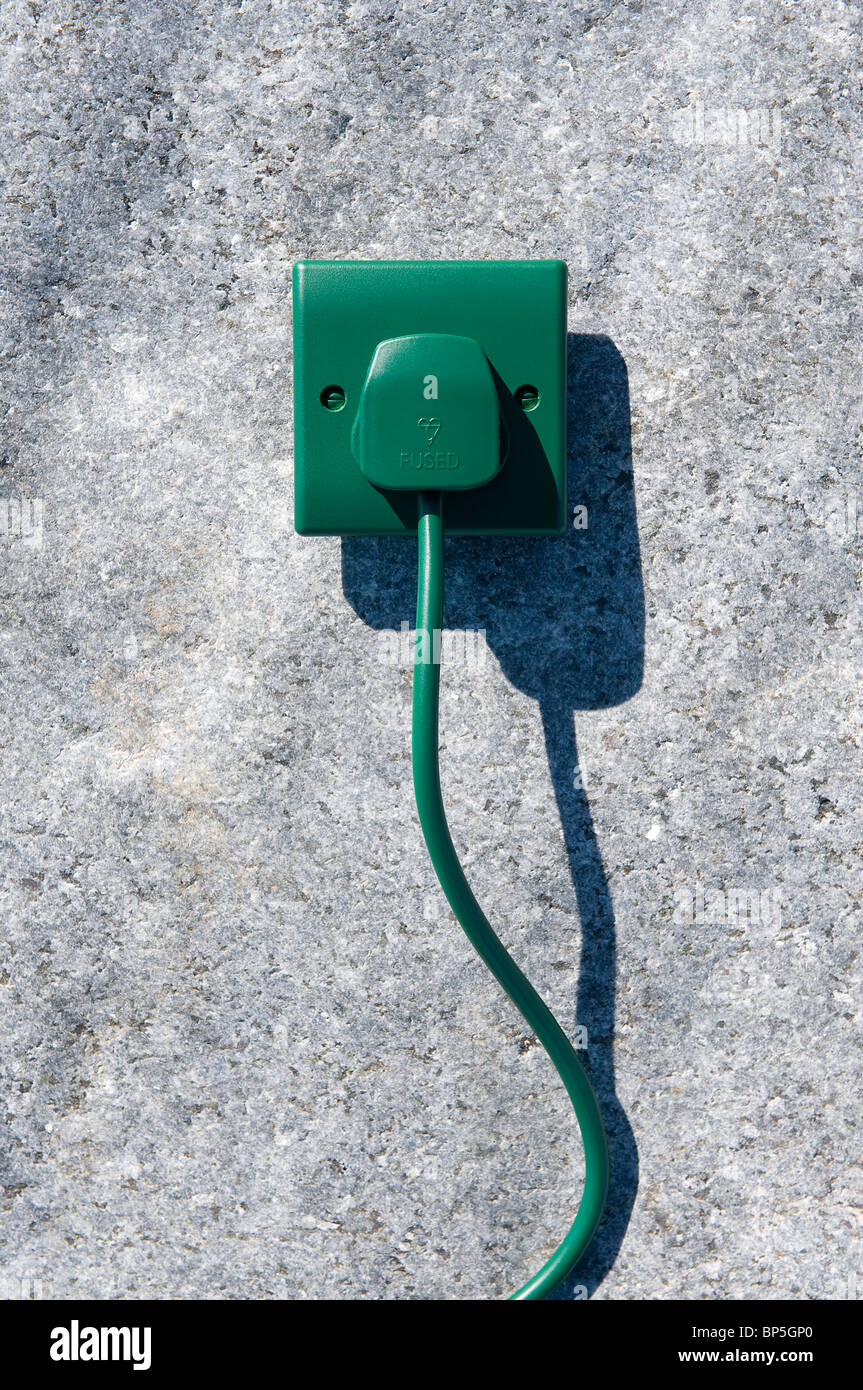 Green electric saving plug in hi-res stock photography and images - Alamy